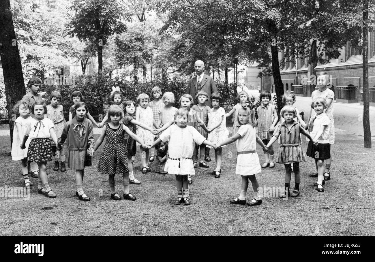 School class girls teachers schoolyard, 1920s, A group of children ...