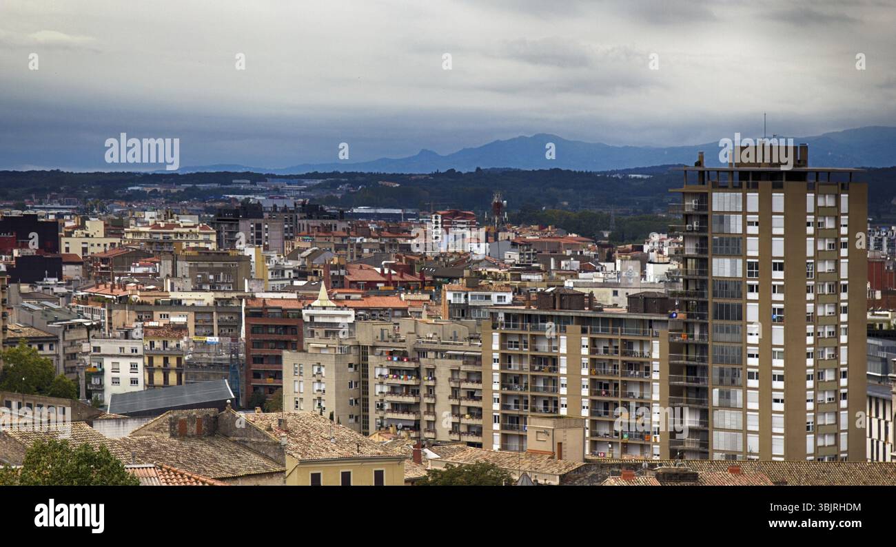 Romantic white city on hills - Spanish town Girona in foothills of ...