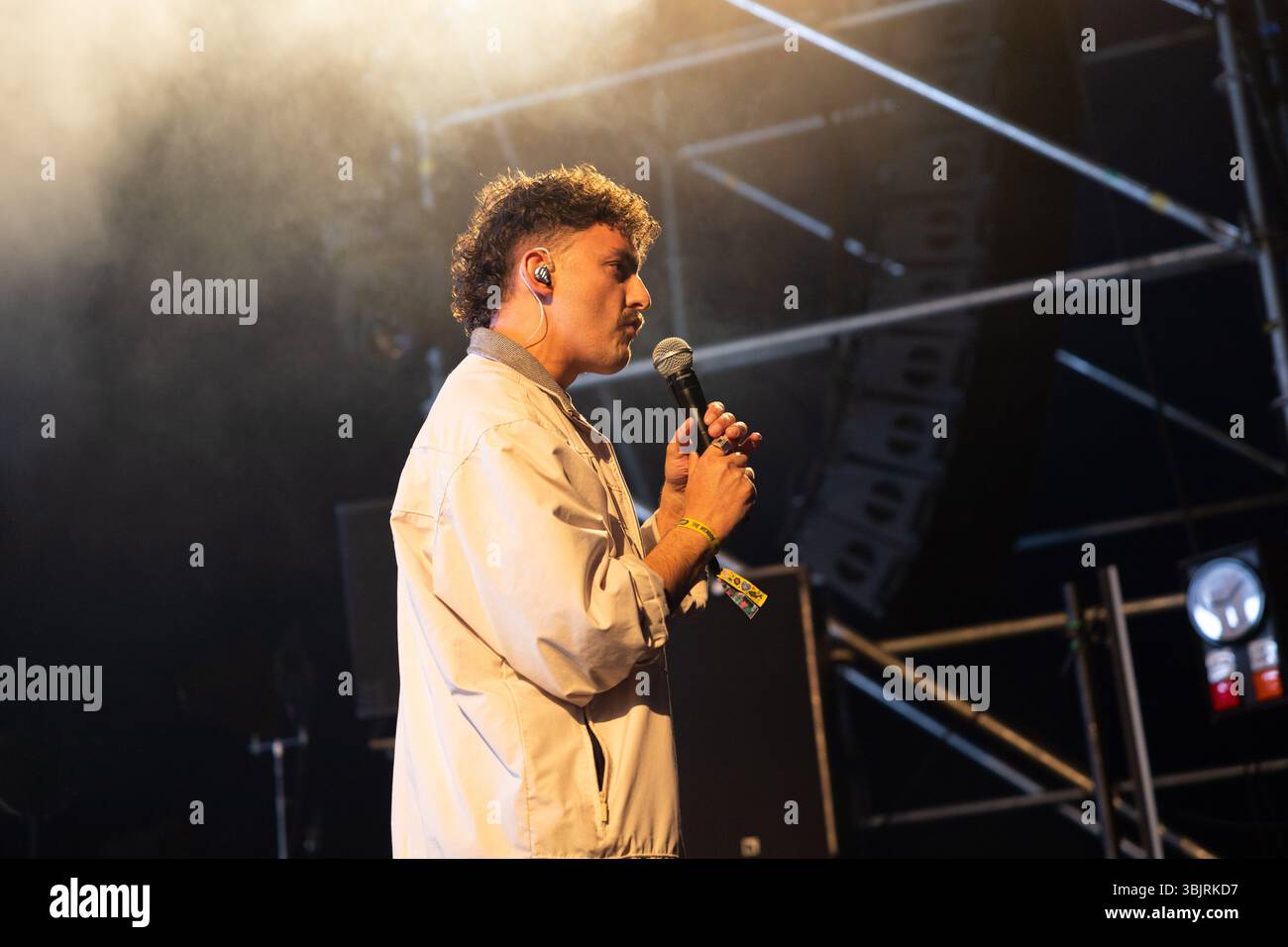 Singer, front man, poet, Antony Szmierek on stage at Bearded Theory ...