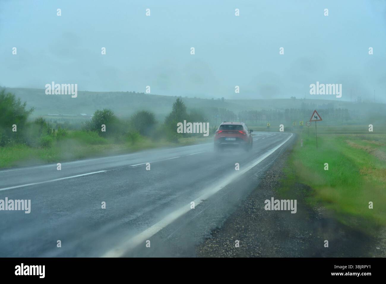 Driving in pouring spring rain on European Route E60 in Transylvania ...
