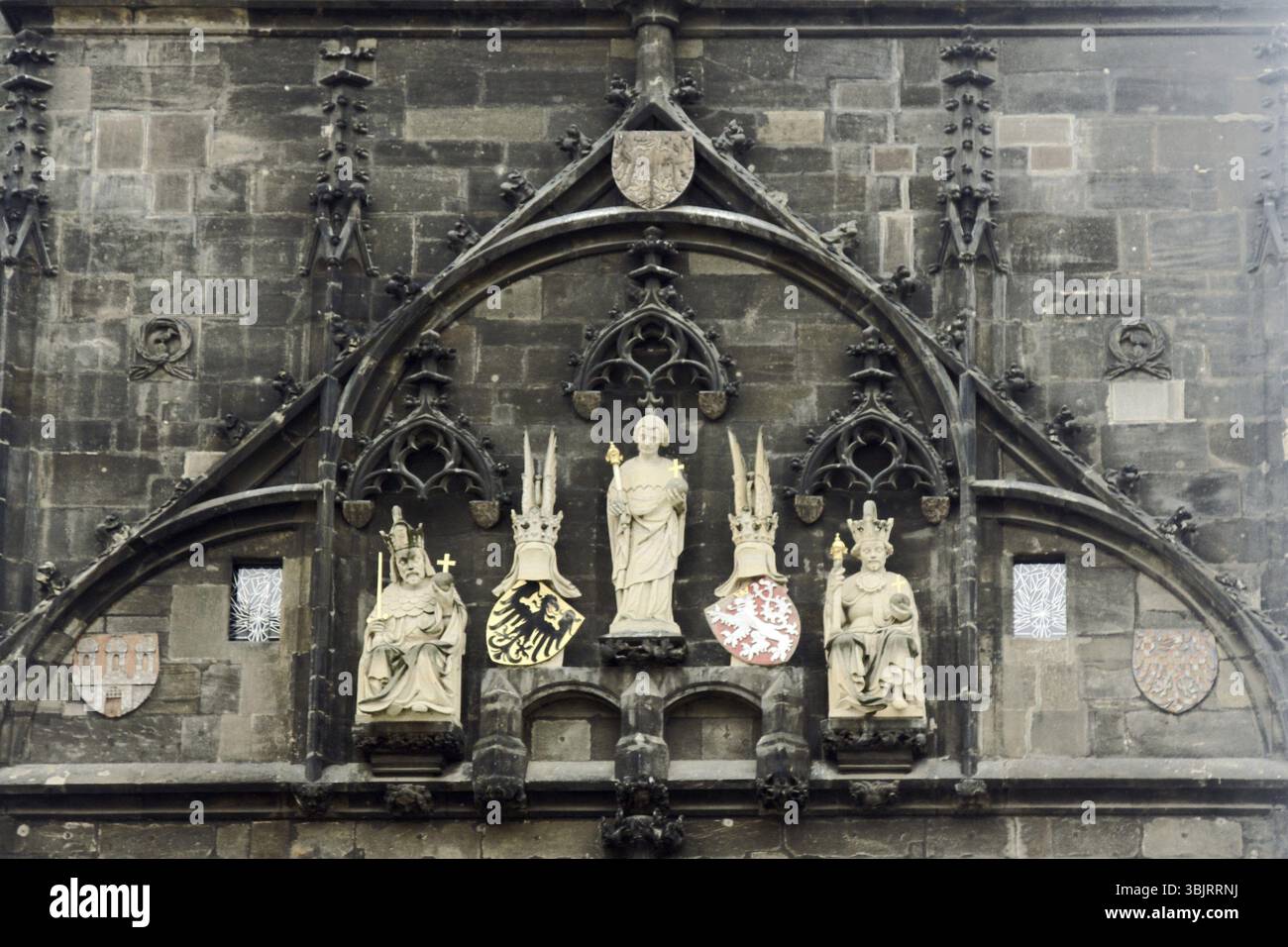 Charles bridge over Vltava river in Prague. Bridge tower Romanesque ...