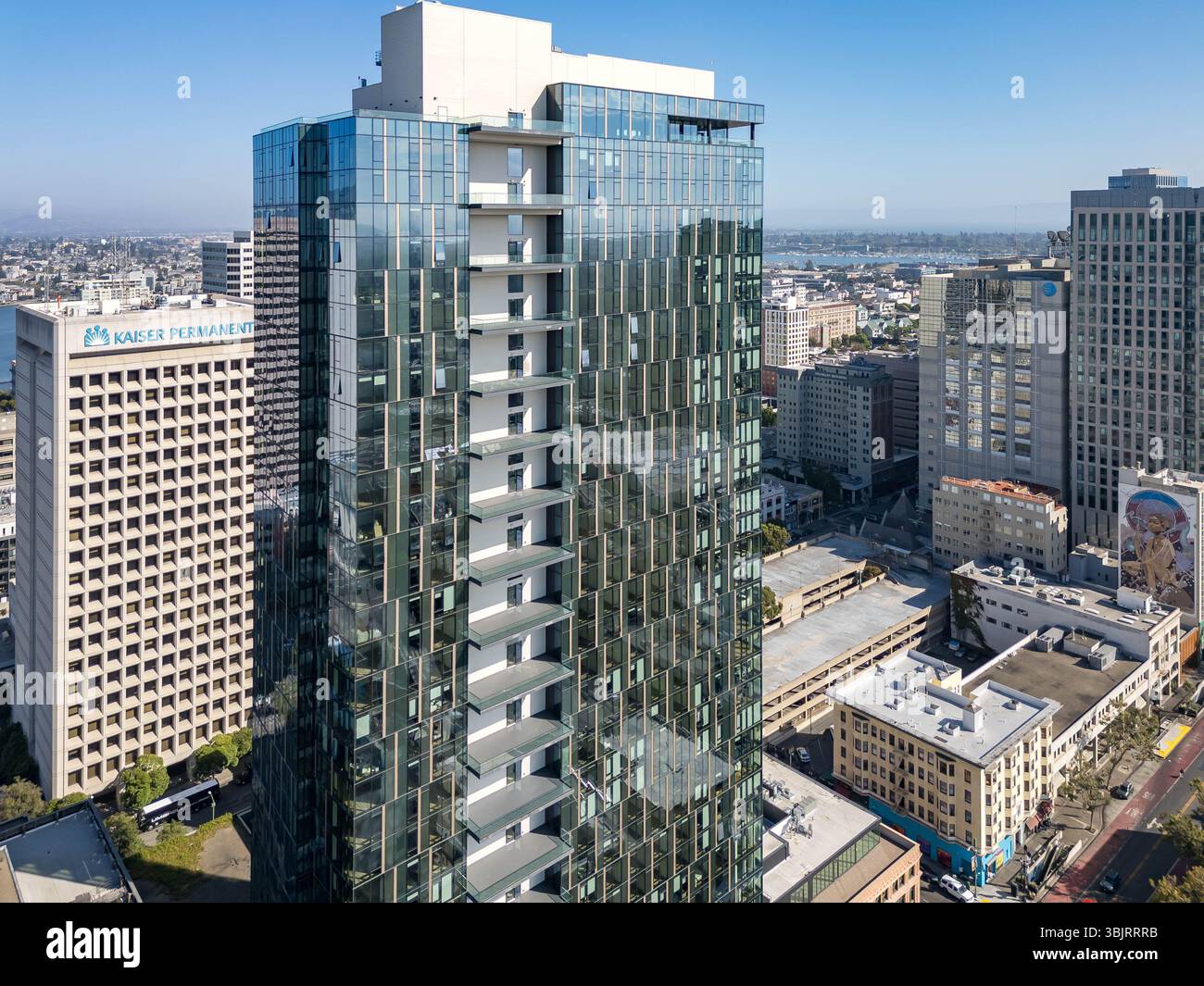 Aerial views of downtown Oakland skyline, highways, and high-rise ...