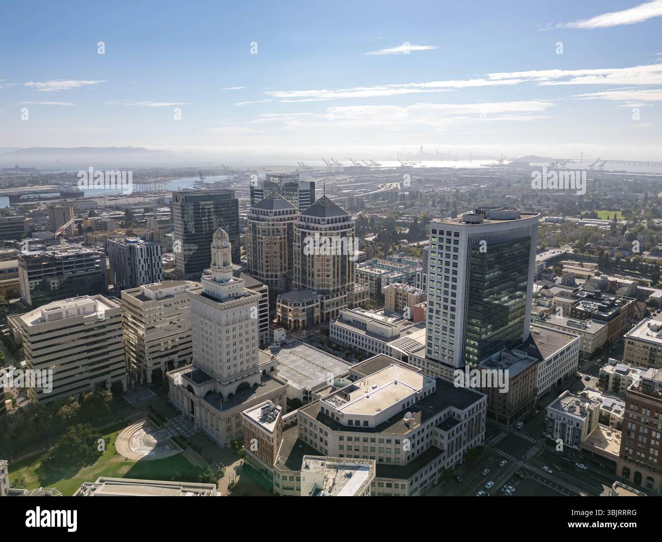 Aerial views of downtown Oakland skyline, highways, and high-rise ...
