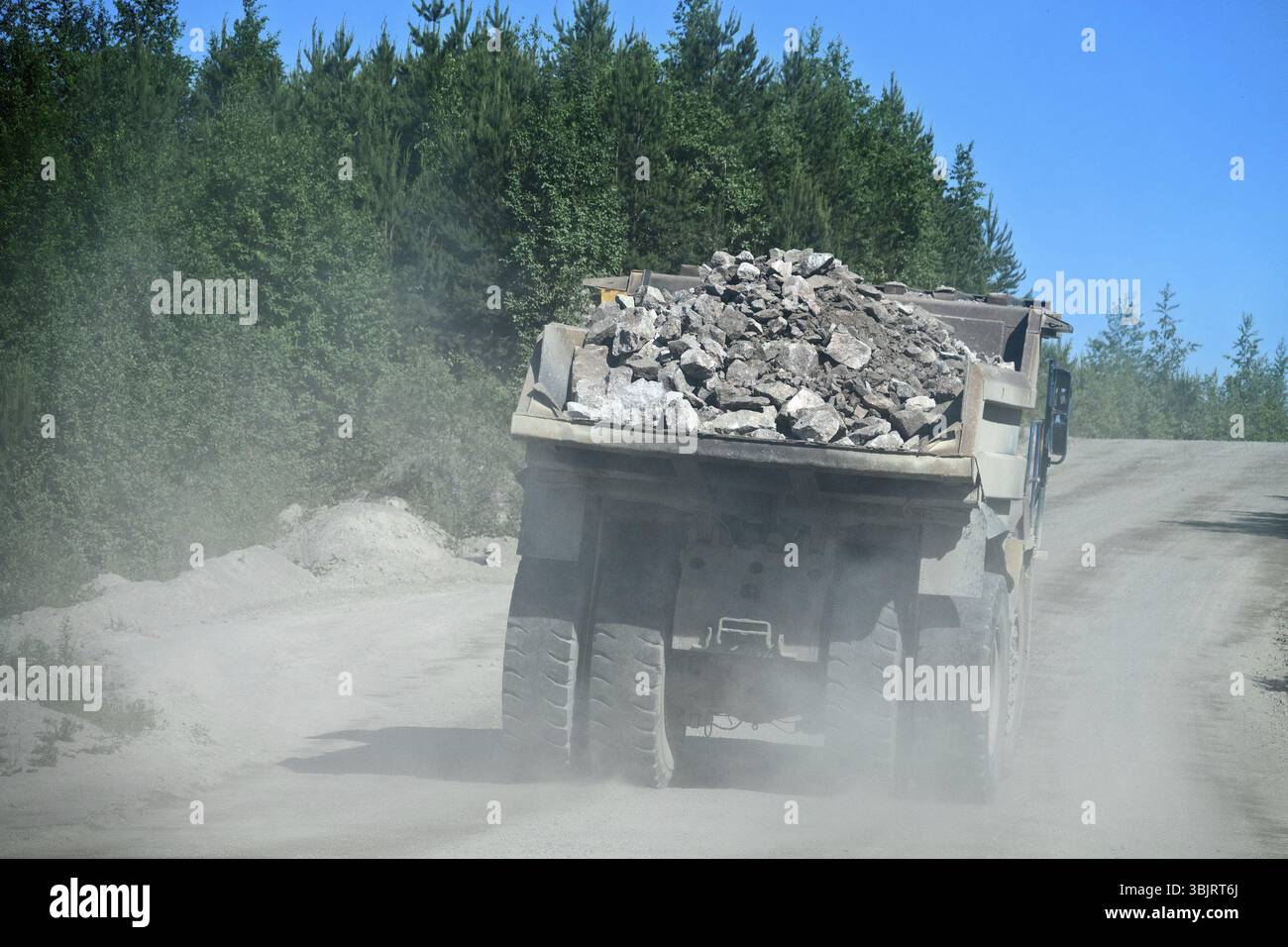 Dump truck rides on road hi-res stock photography and images - Alamy