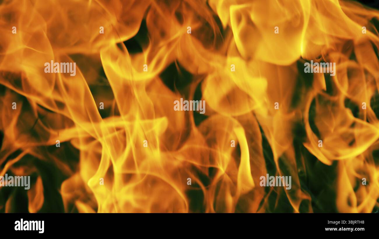 Prairie fire, burnt grass. Tongues of fire twist into flame Stock Photo - Alamy