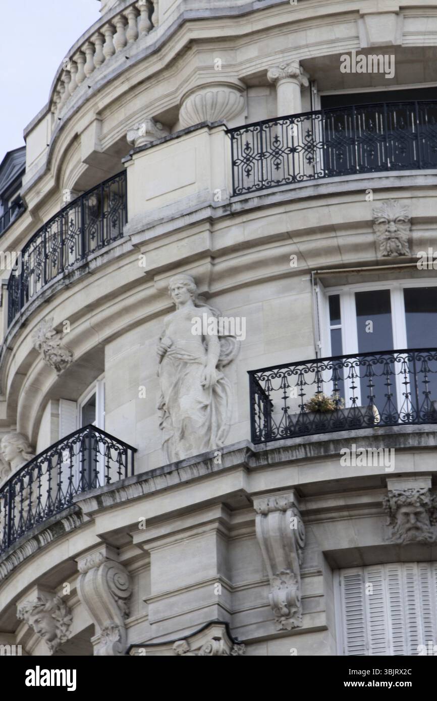 The old corner building with a circular Foundation, balcony with a ...