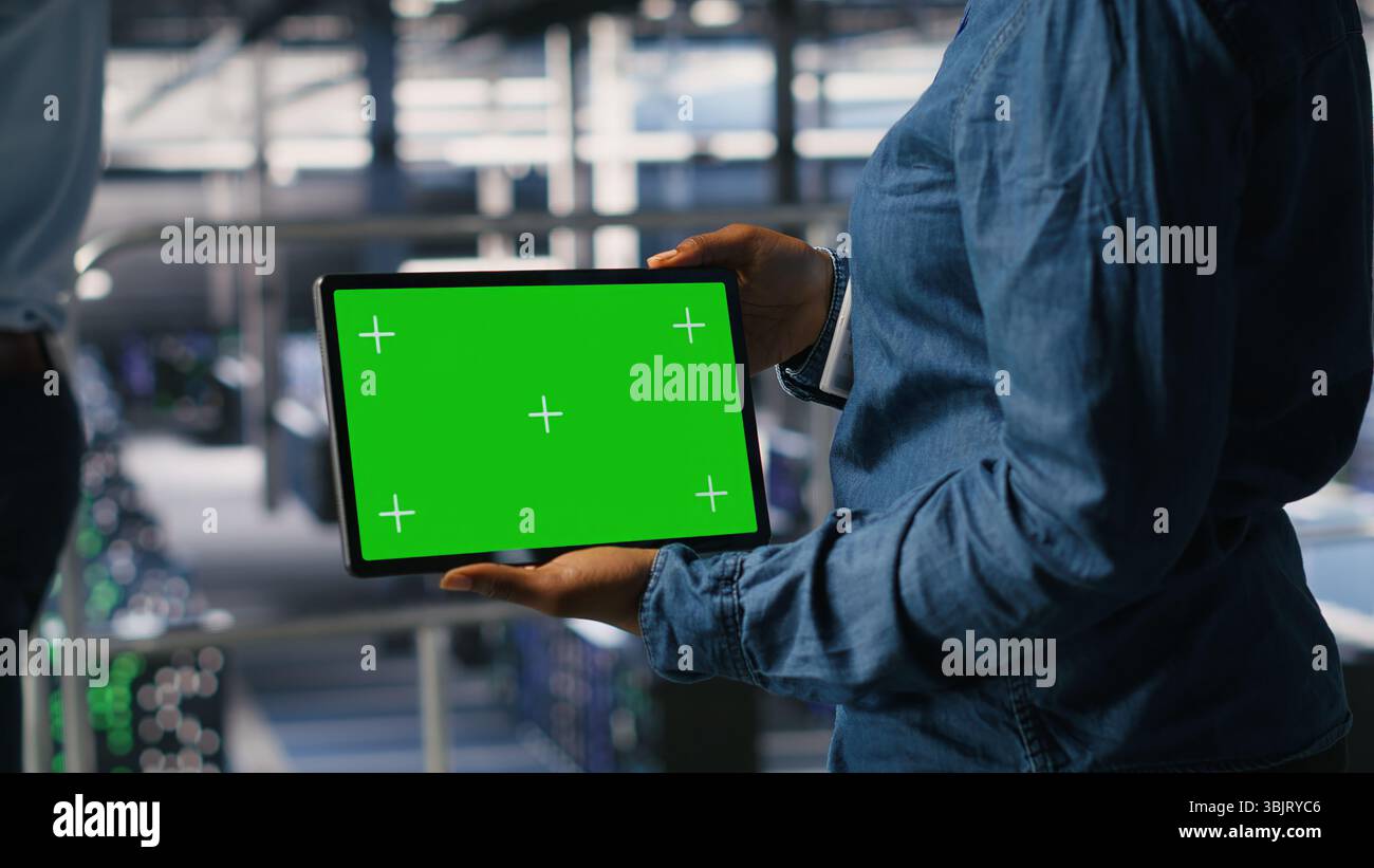 Close up of IT experts using chroma key device to analyze neural ...