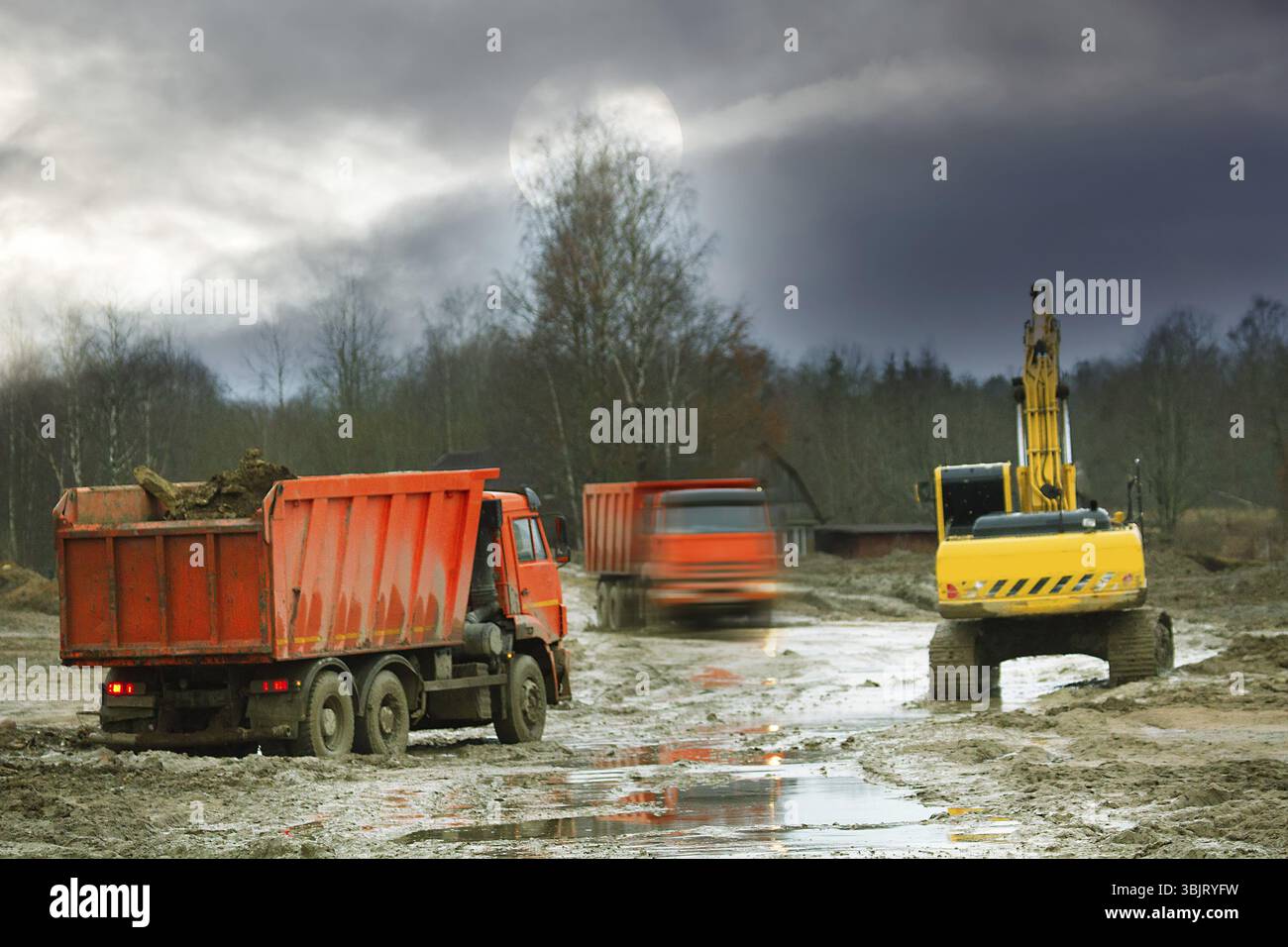 Preparation of the site for construction, leveling the soil. Excavator ...
