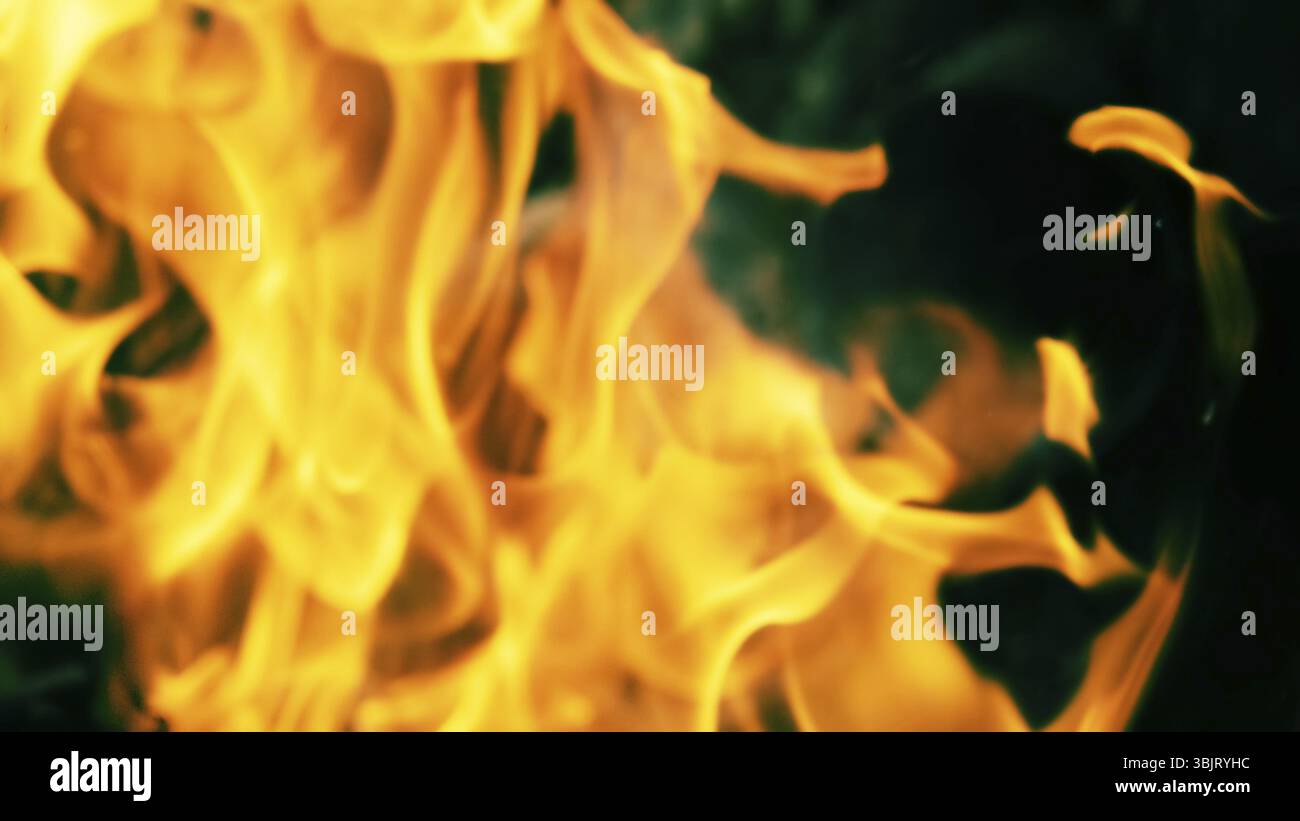 Prairie fire, burnt grass. Tongues of fire twist into flame Stock Photo ...