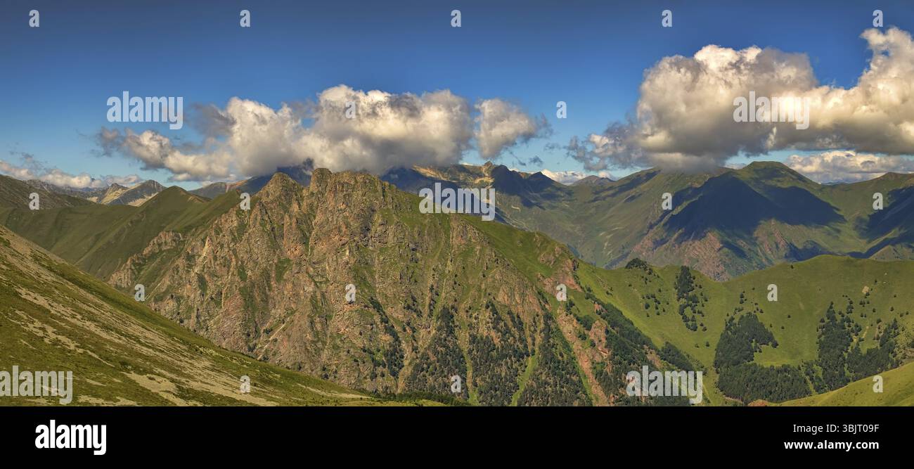 Summer in the mountains. Rocky hills and beautiful cloud shadows on the ...