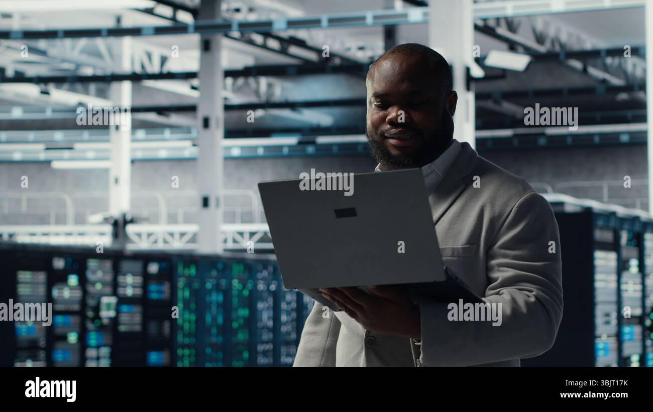Server room worker auditing systems hi-res stock photography and images ...