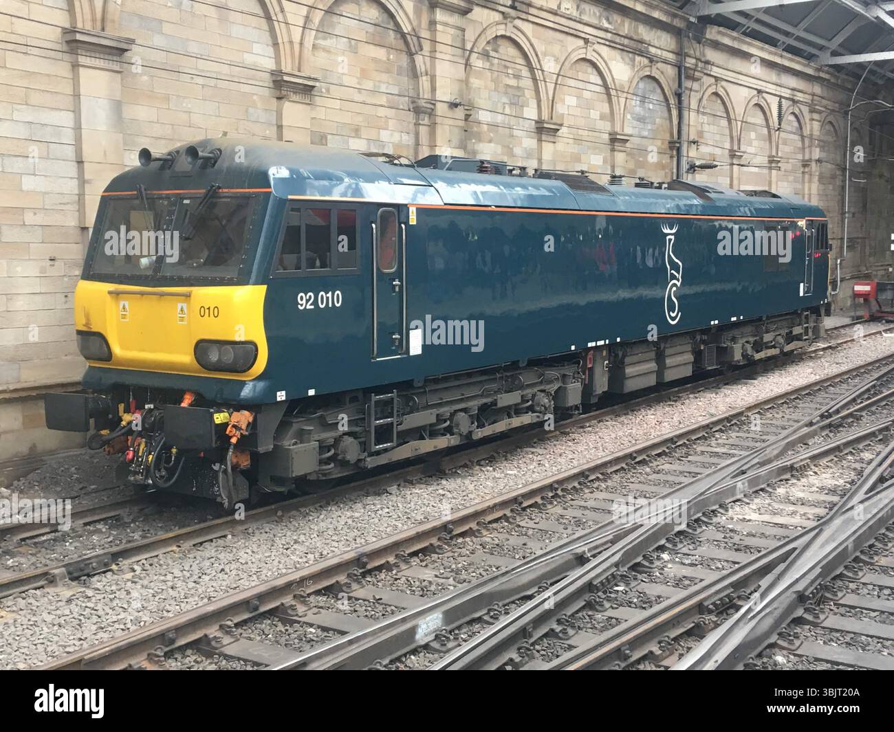 A Class 92 electric locomotive, adorned in the distinctive 'Midnight ...