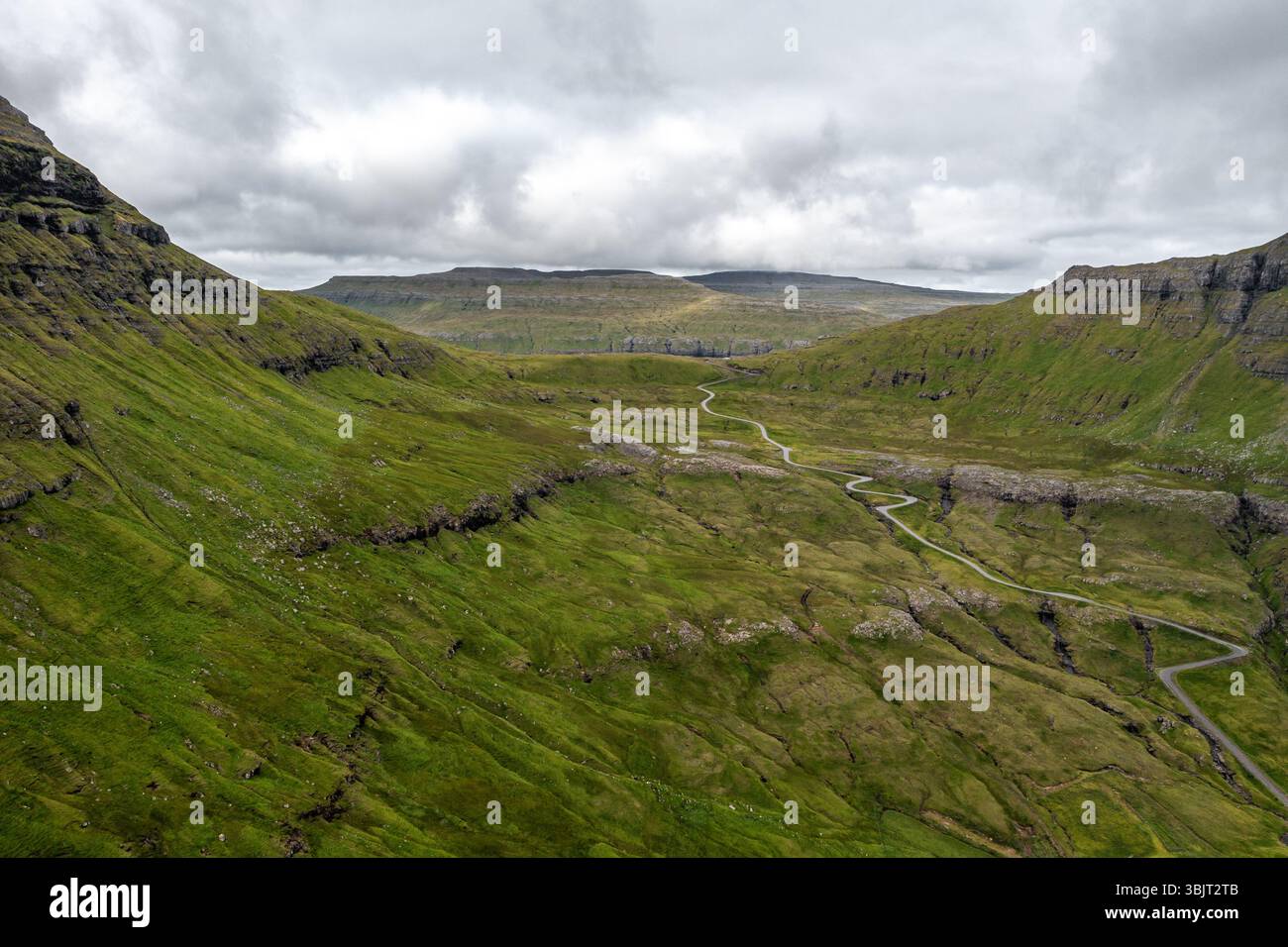 Exploring lush valleys in mountains hi-res stock photography and images ...