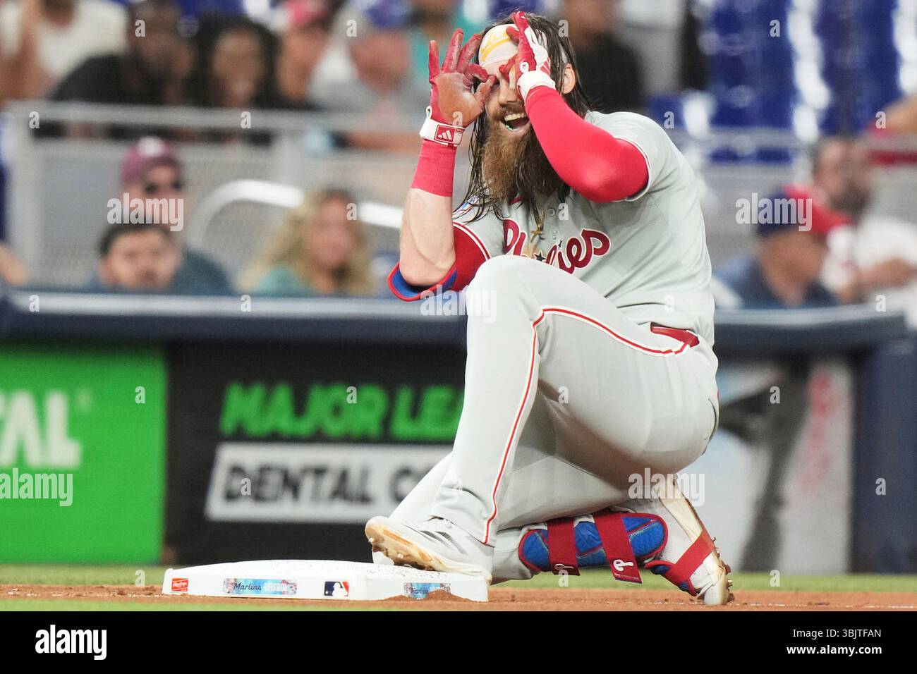 Philadelphia Phillies' Brandon Marsh reacts after hitting a triple ...