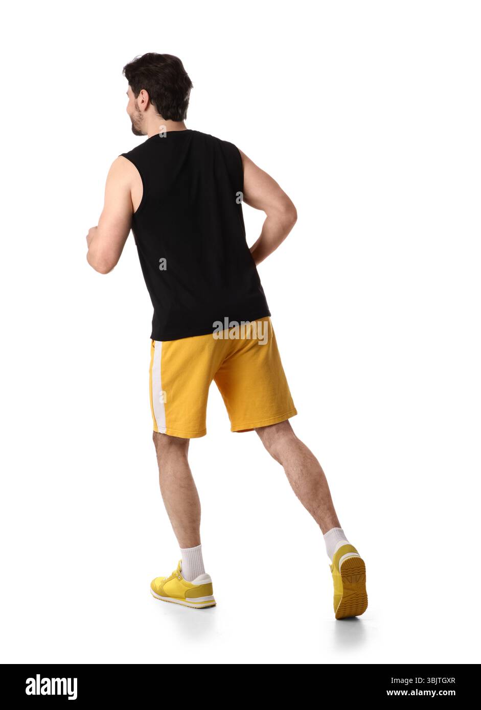 Sporty young man running marathon on white background, back view Stock ...