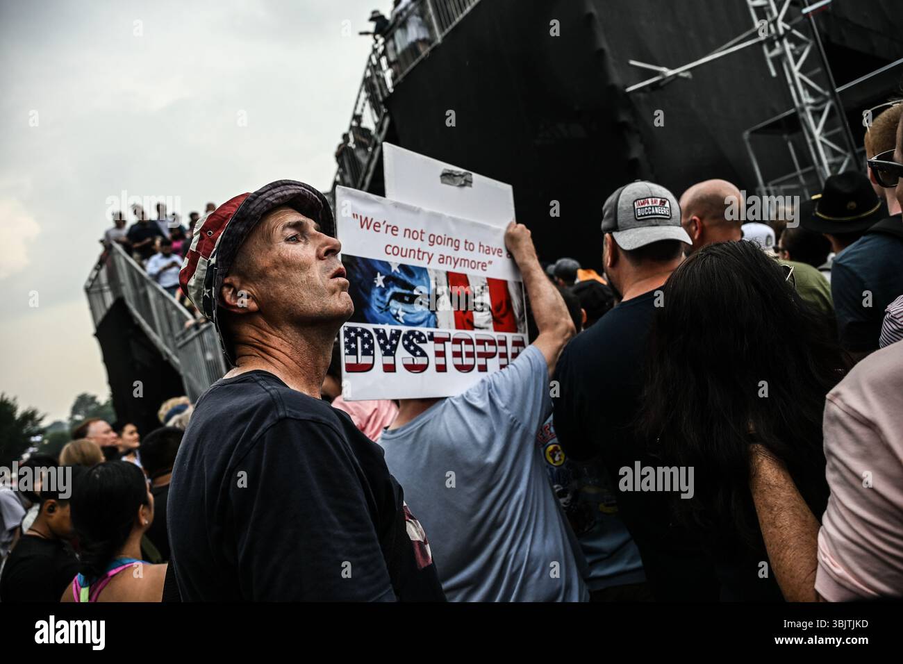 Washington, United States. 14th June, 2025. A protester holds a placard ...