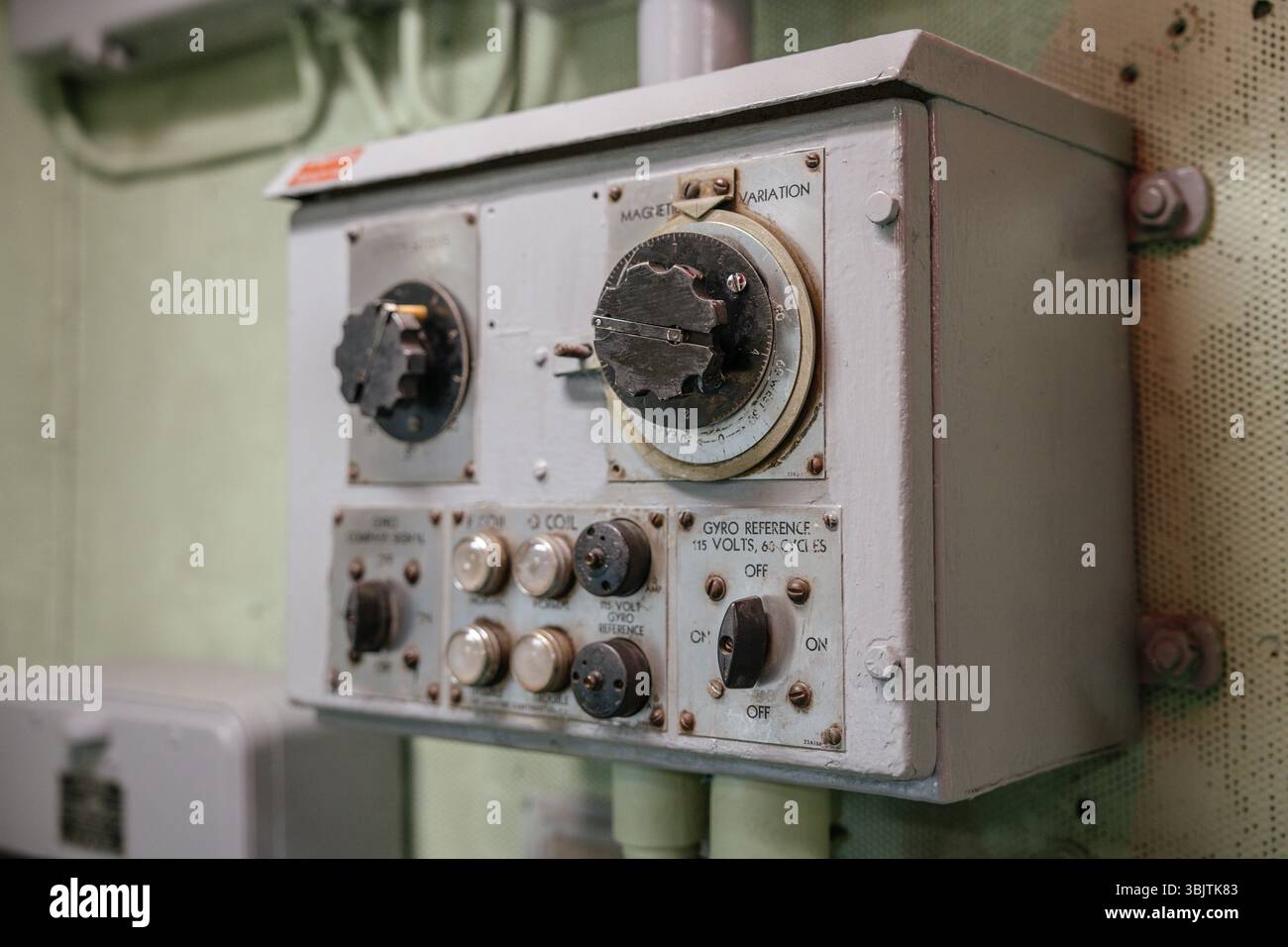 Close-up of an old gyro navigation control panel with labeled dials and ...