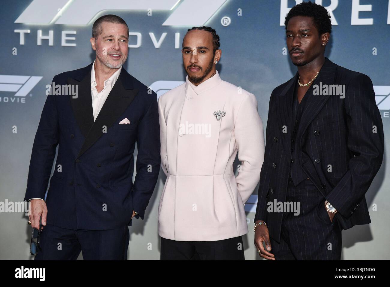Brad Pitt, Lewis Hamilton and Damson Idris walking on the red carpet ...