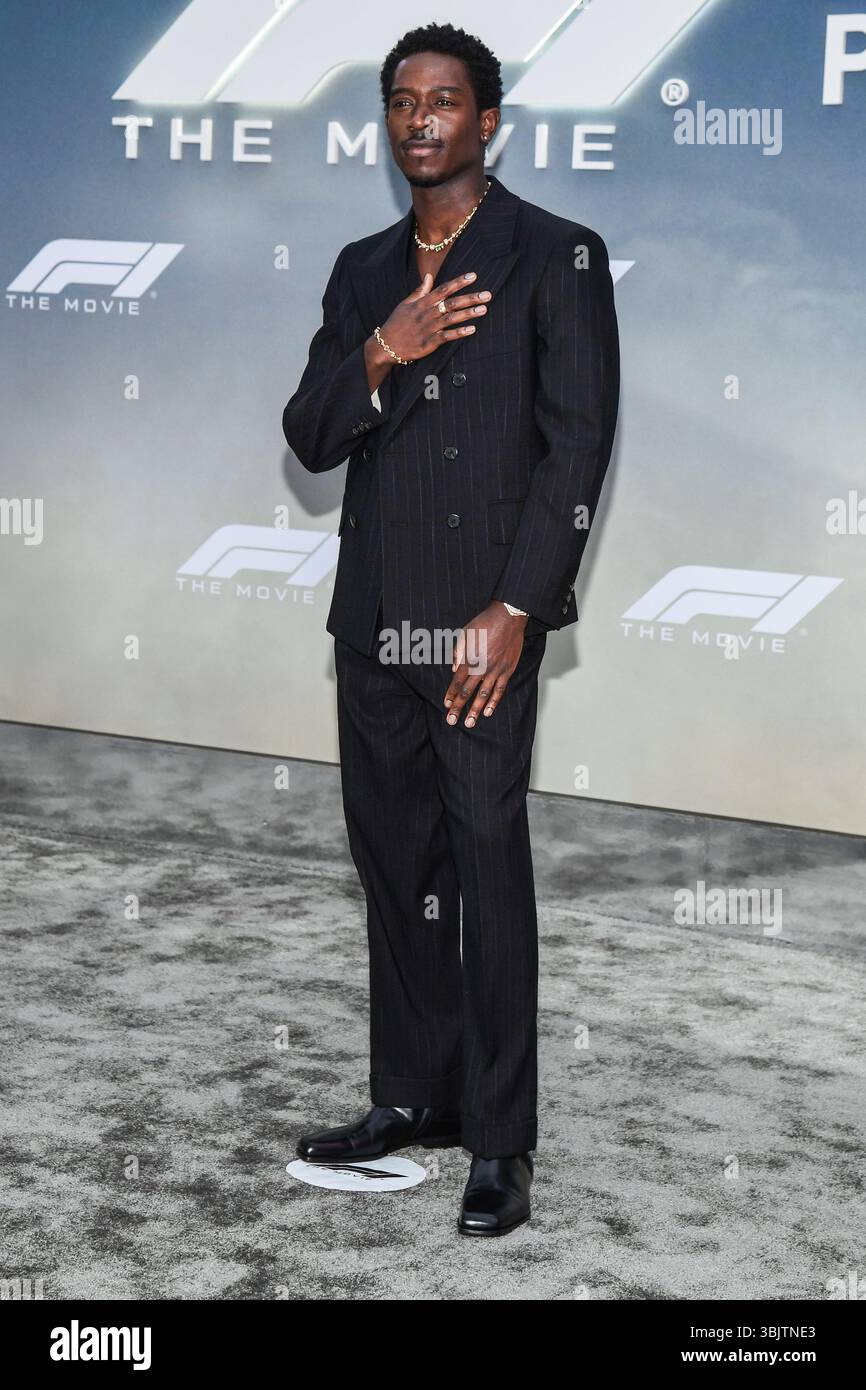 Damson Idris walking on the red carpet during “F1: The Movie” New York ...