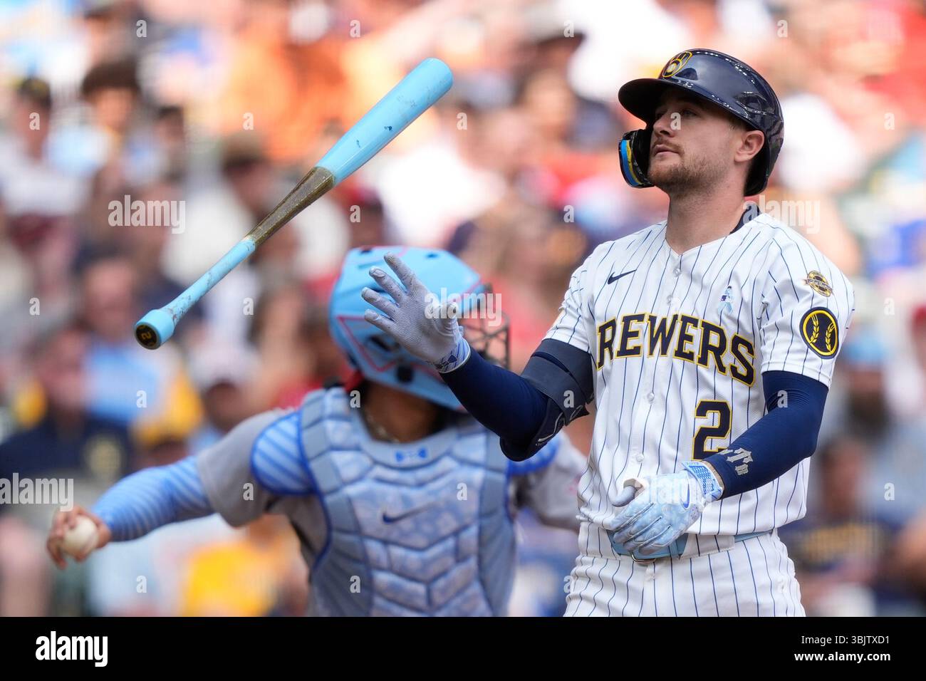 Milwaukee Brewers' Brice Turang reacts after striking out during a ...