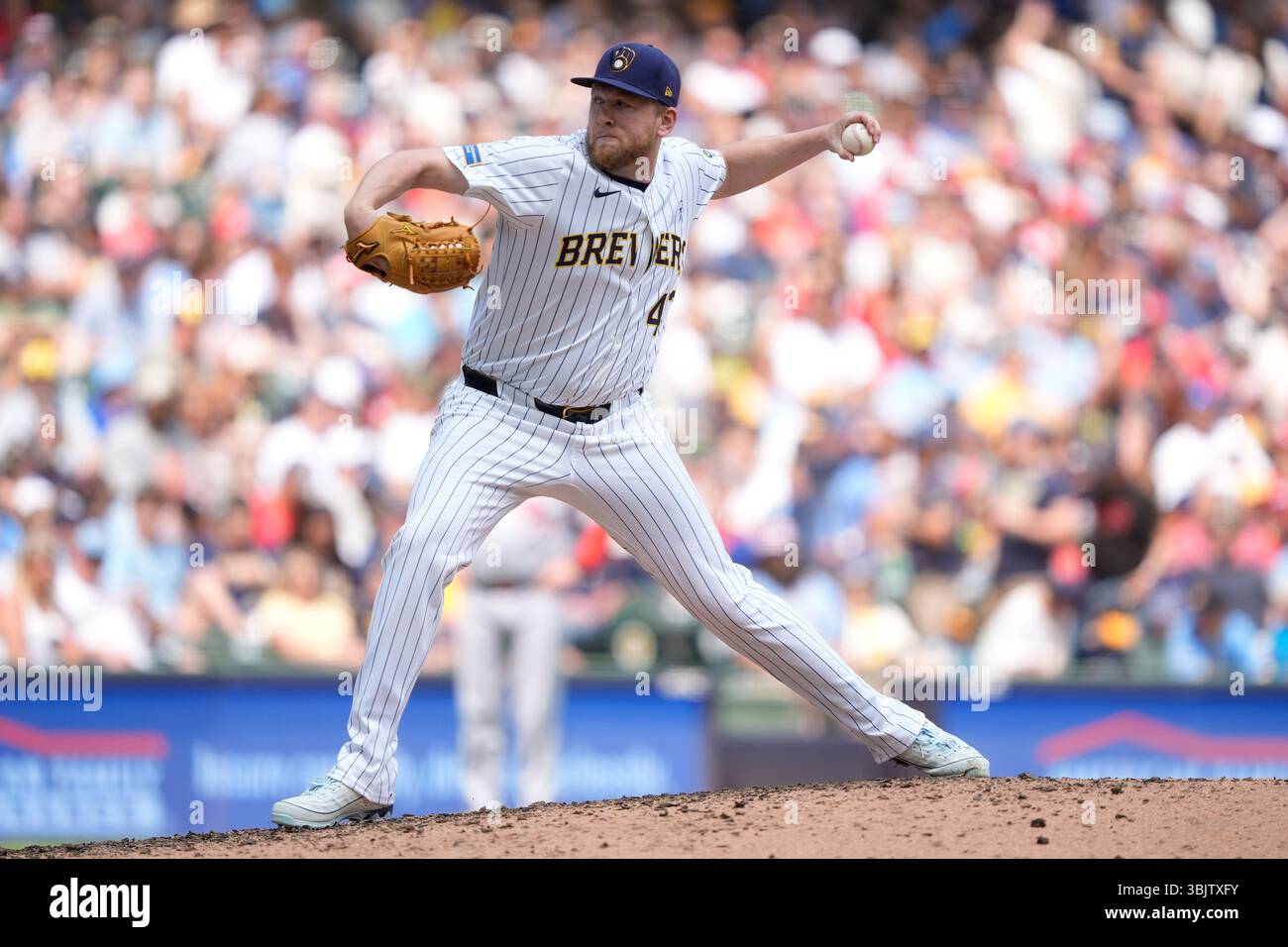Milwaukee Brewers' Jared Koenig pitches during a baseball game against ...