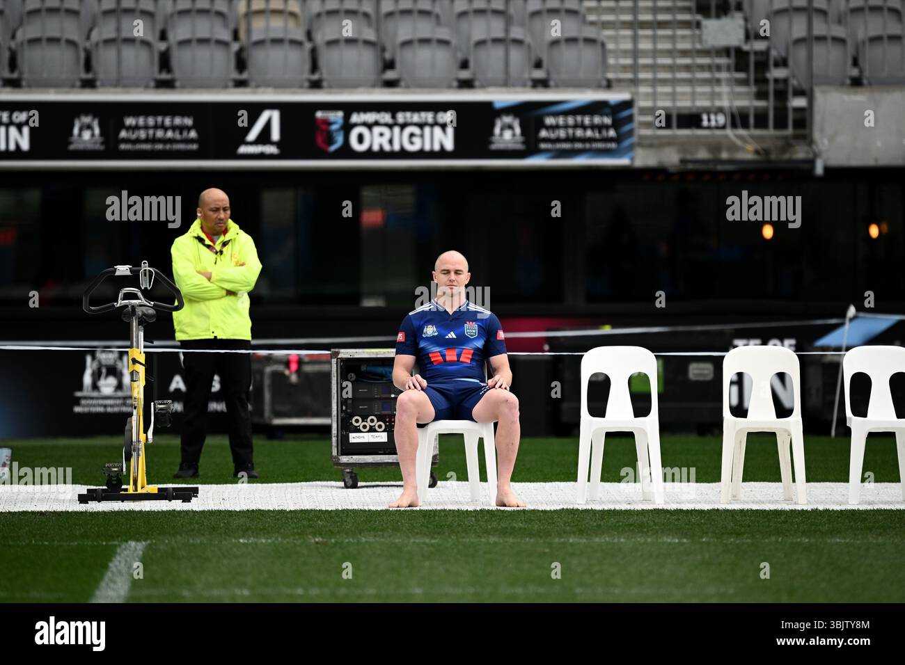 Dylan Edwards sits with hie eyes closed during a NSW Blues State of ...