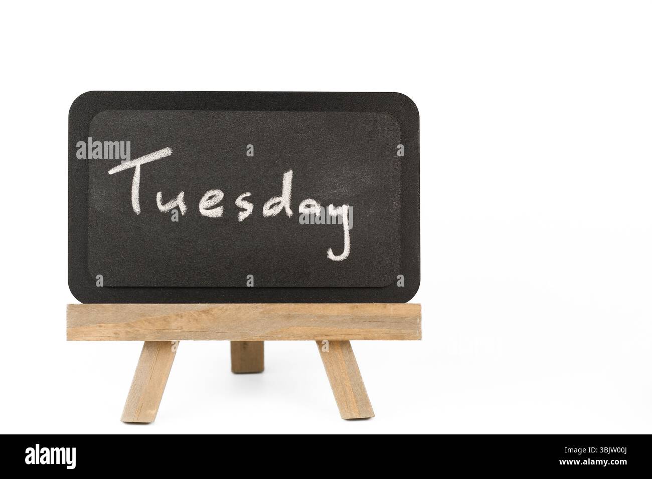 Chalkboard Display Tuesday Written in Chalk Stock Photo - Alamy