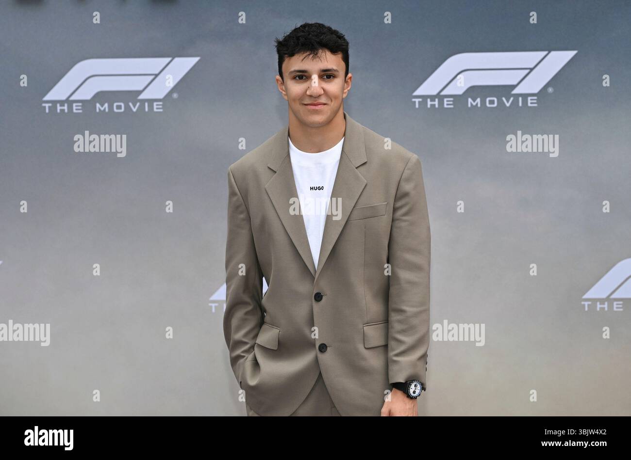 French-Algerian Formula One driver Isack Hadjar attends the world ...