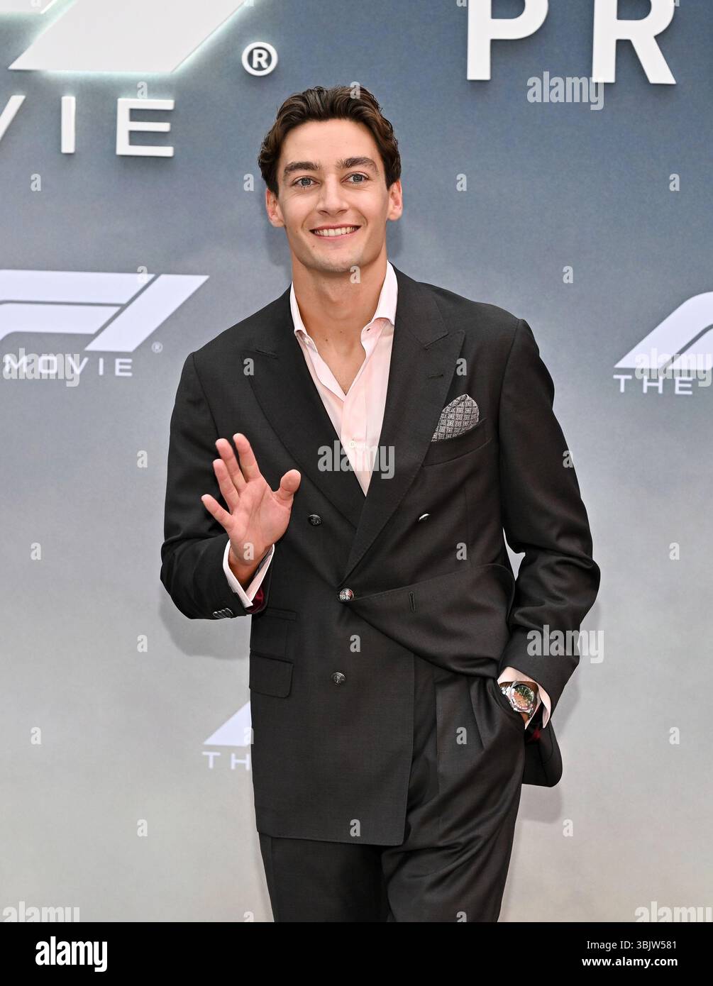 British Formula One driver George Russell attends the world premiere of ...