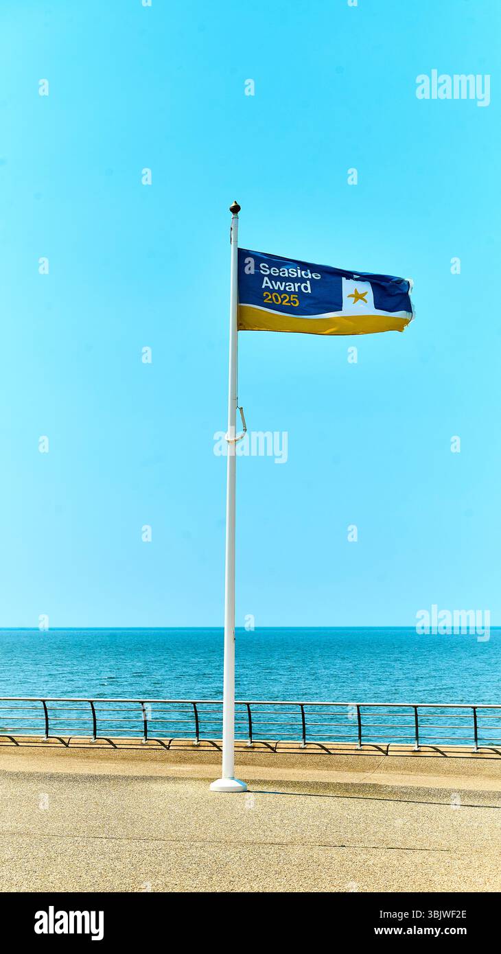Seaside awards flag flying on Blackpool promenade in summer Stock Photo ...