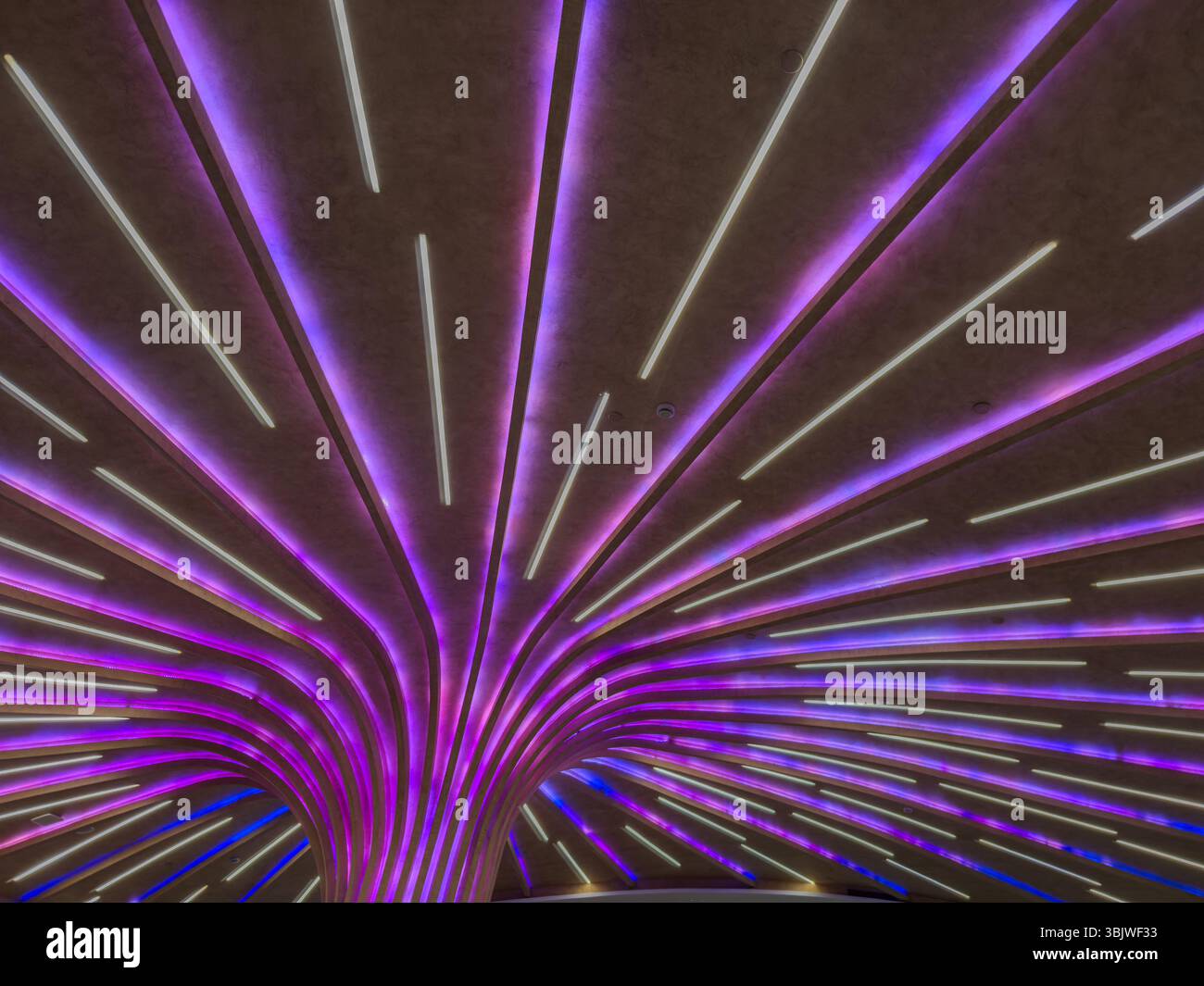 Modern ceiling installation with LED light strips. Futuristic interior ...