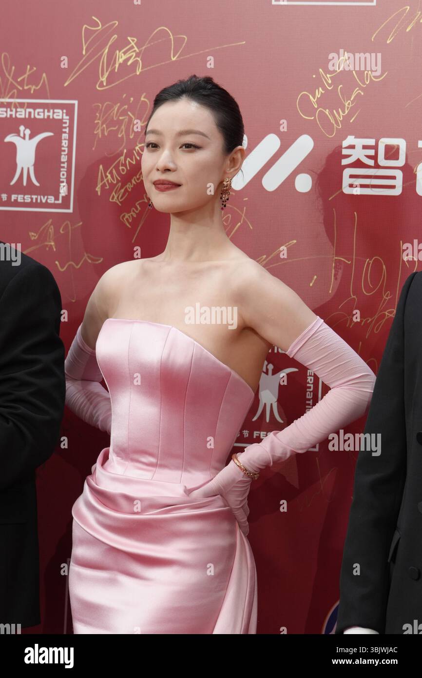 Chinese actress Ni Ni poses for a photo on the red carpet at the ...