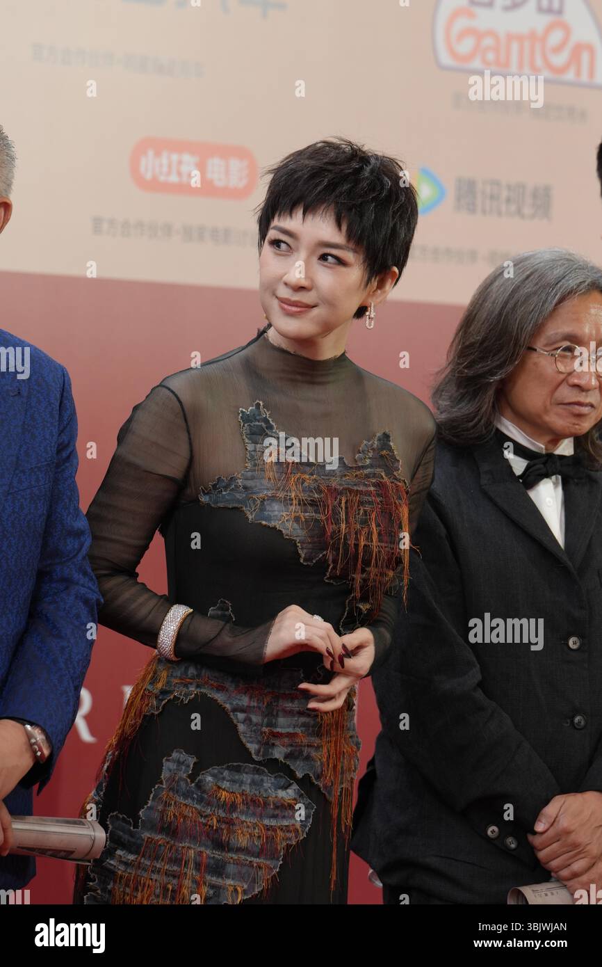 Chinese actress and model Zhang Ziyi poses for a photo on the red ...