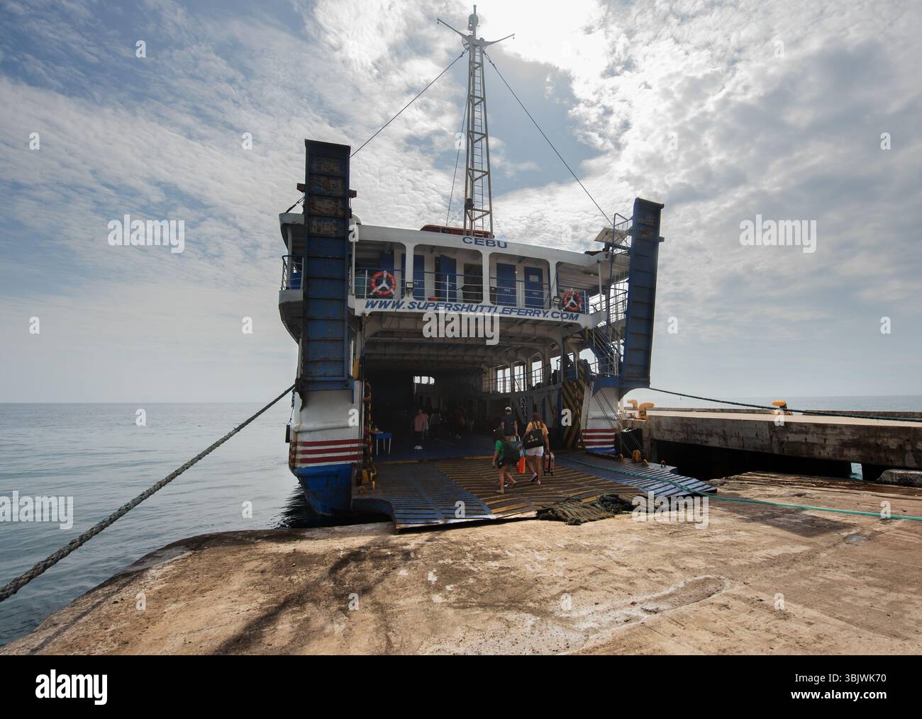 Passengers boarding the Ferry boat between Camiguin and Bohol Islands ...
