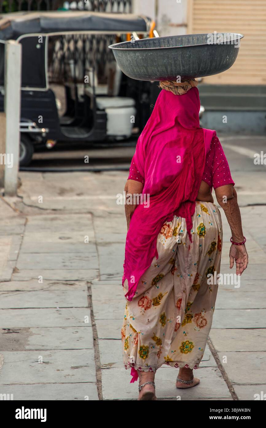 Woman walking barefoot street hi-res stock photography and images - Alamy