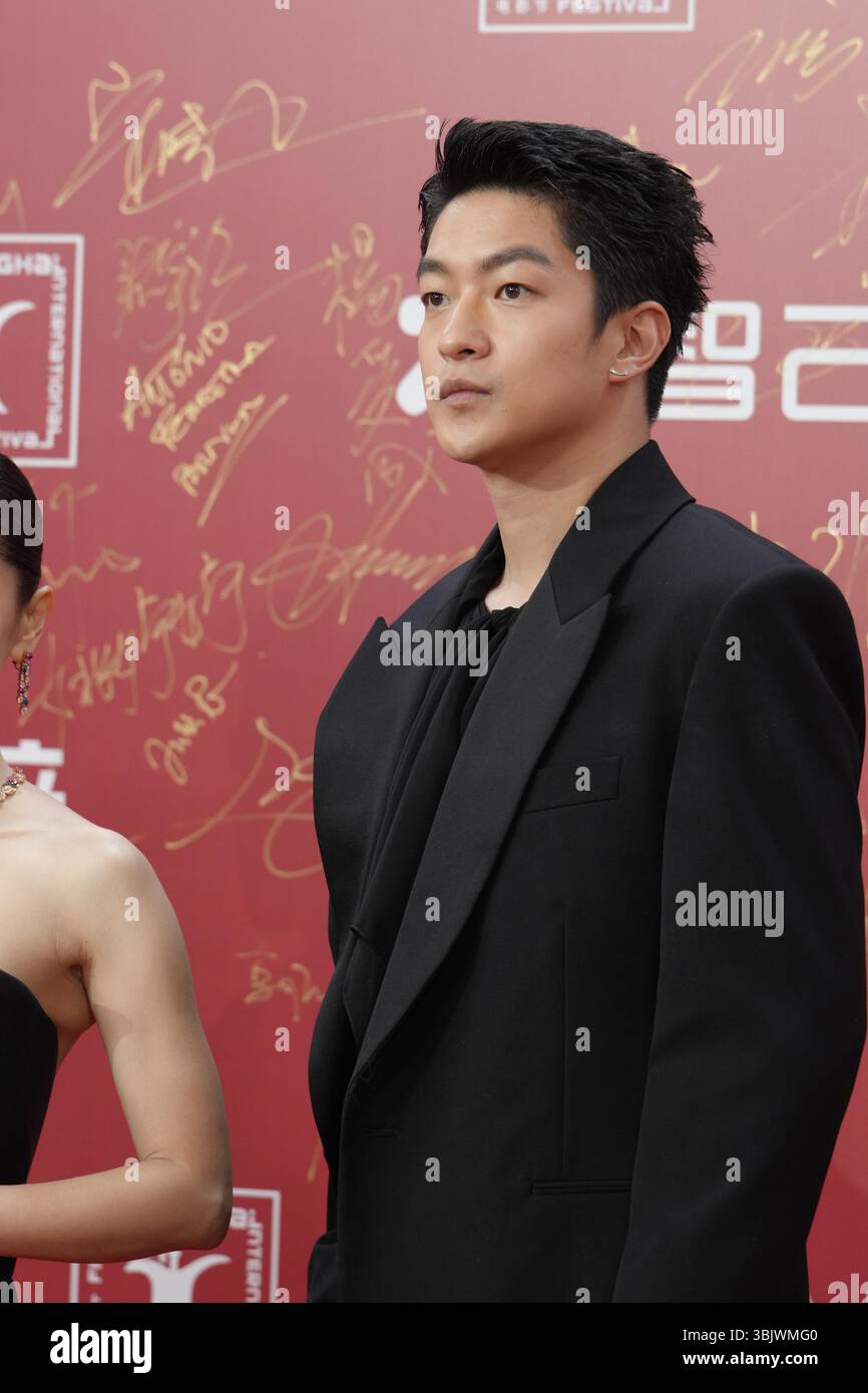 Chinese actor and singer Qu Chuxiao poses for a photo on the red carpet ...
