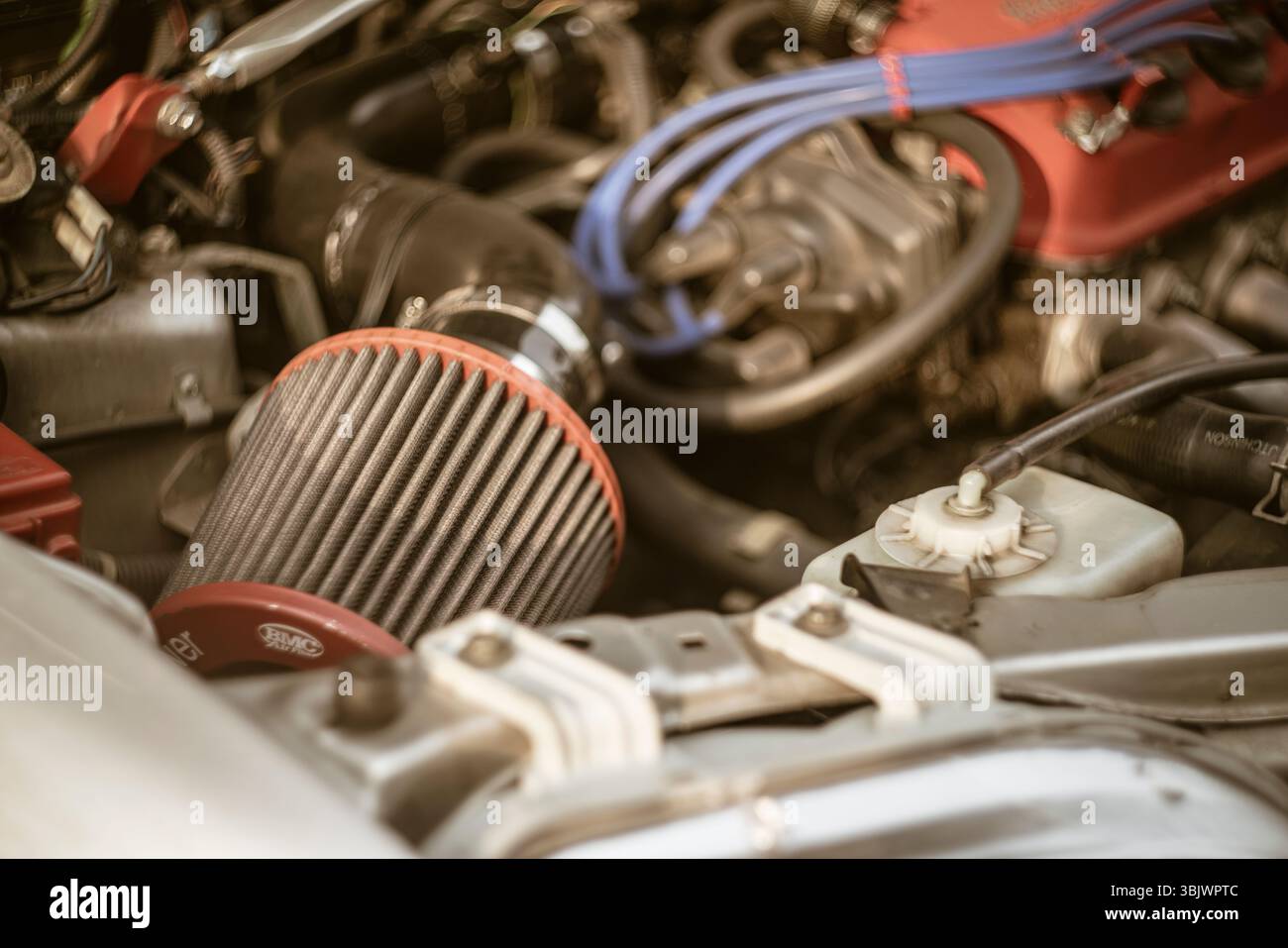 Rome, italy 17 june 2025, clean air filter installed in a car engine ...