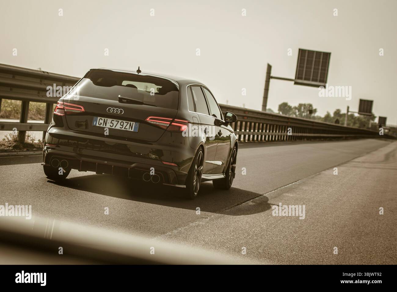 Rome, italy 17 june 2025, modern black audi s3 sportback driving fast ...