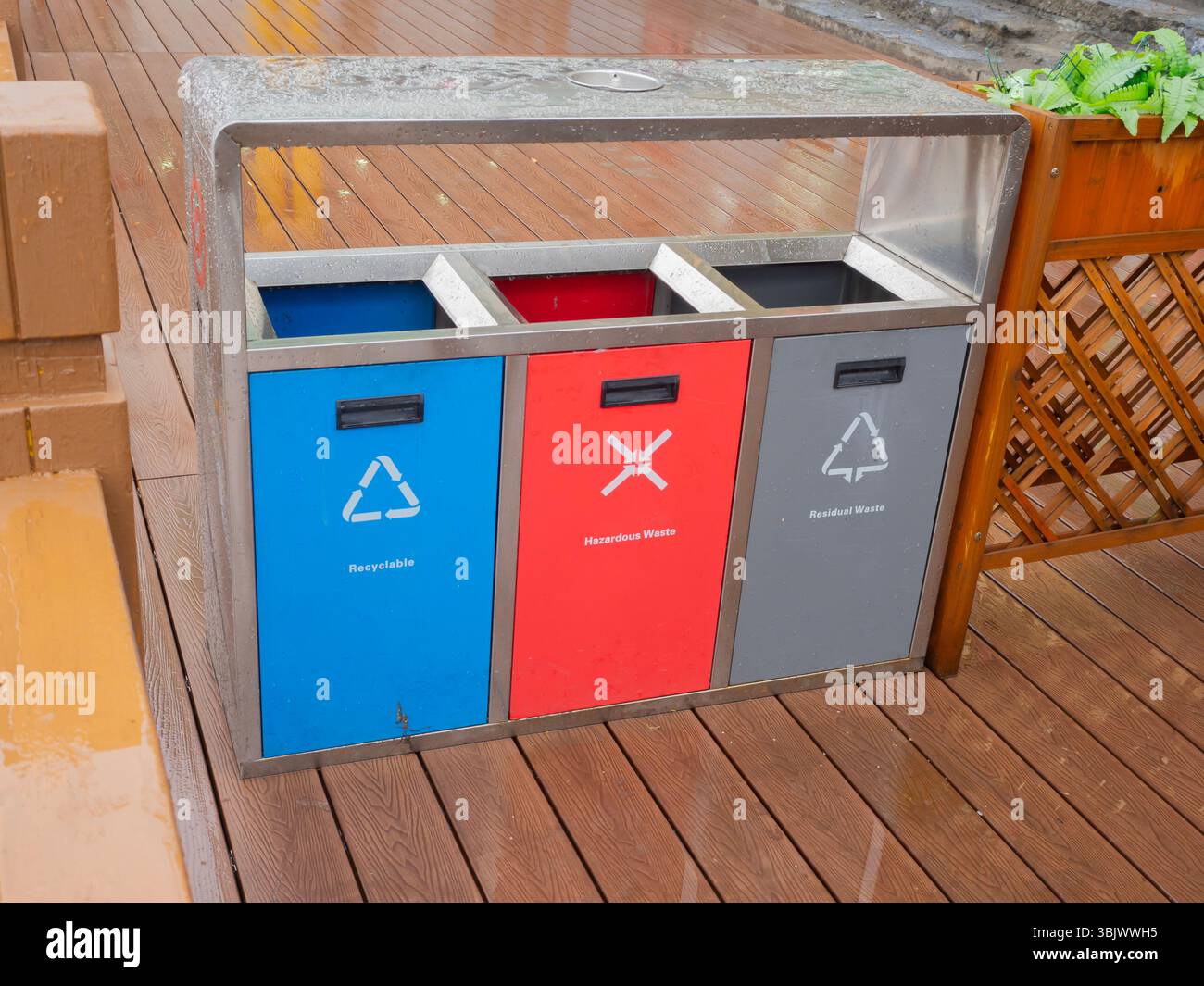 Recycle bins in front of the street park for environment. Colorful bins ...