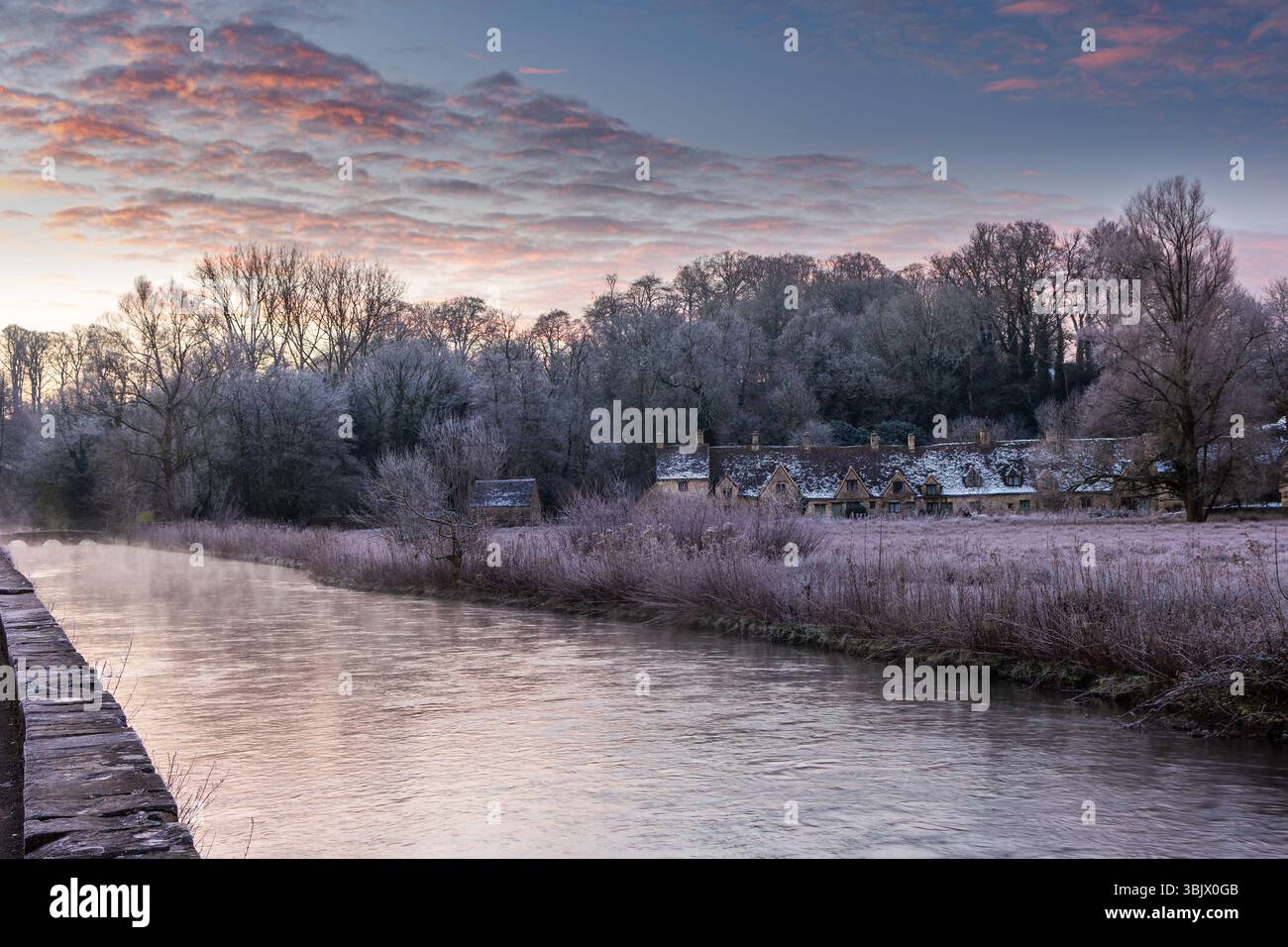Winter sunrise over Arlington Row, Bibury in the Cotswolds Stock Photo ...