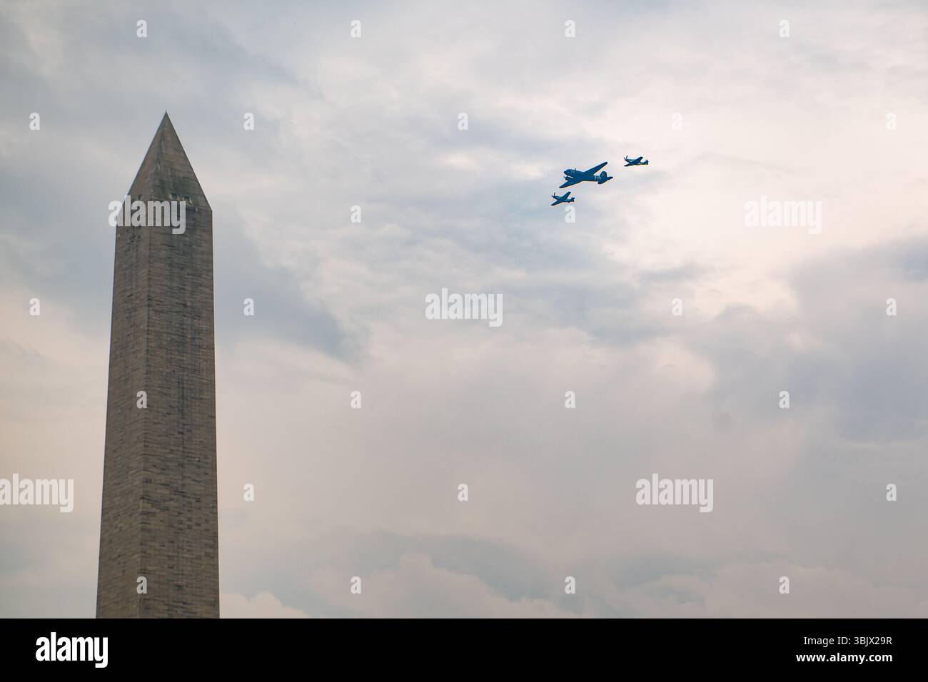 U.S. Army WWII Era aircraft conduct a flyover as a part of the 250th ...
