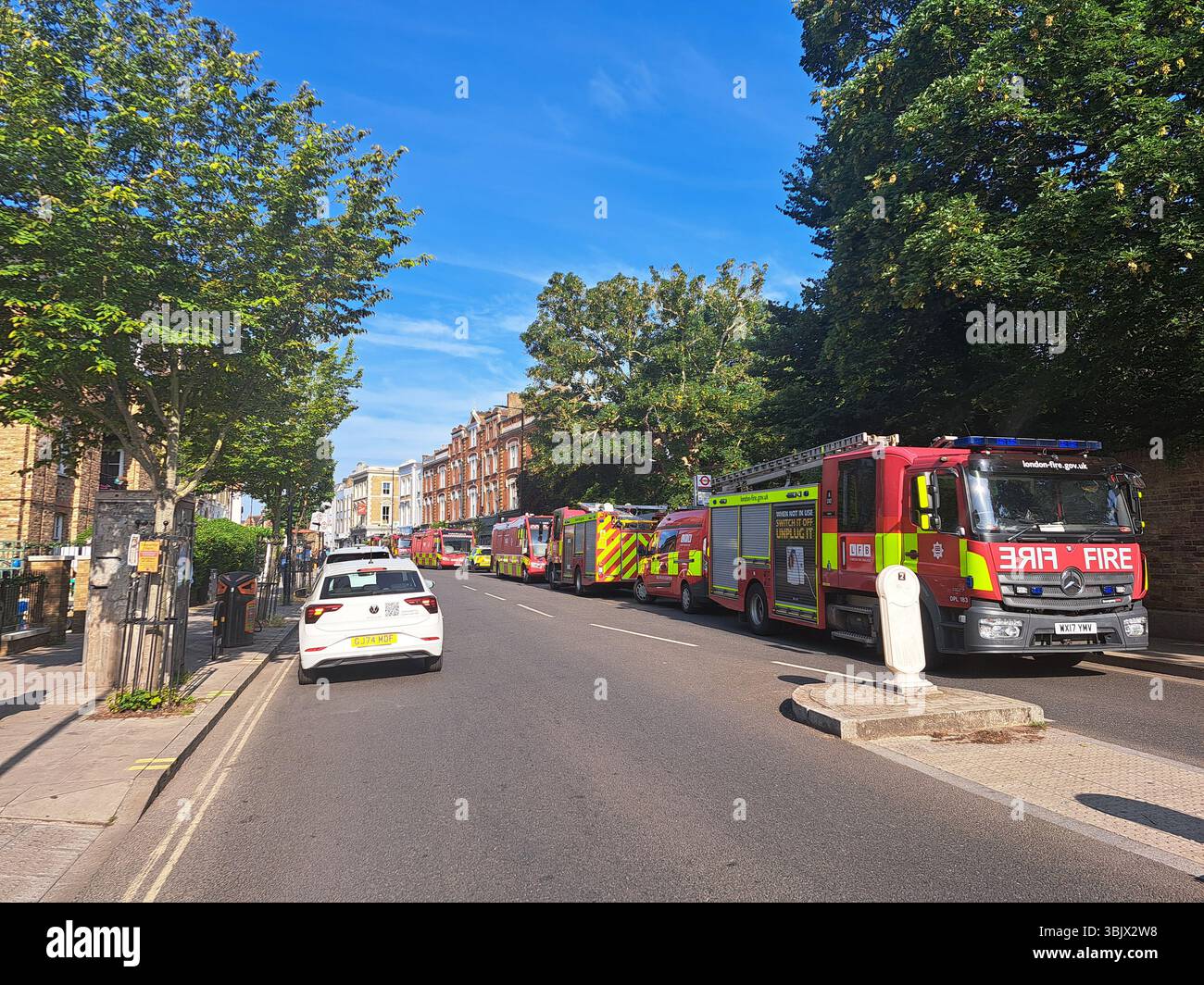 Emergency services near to the scene of a suspected gas explosion which ...