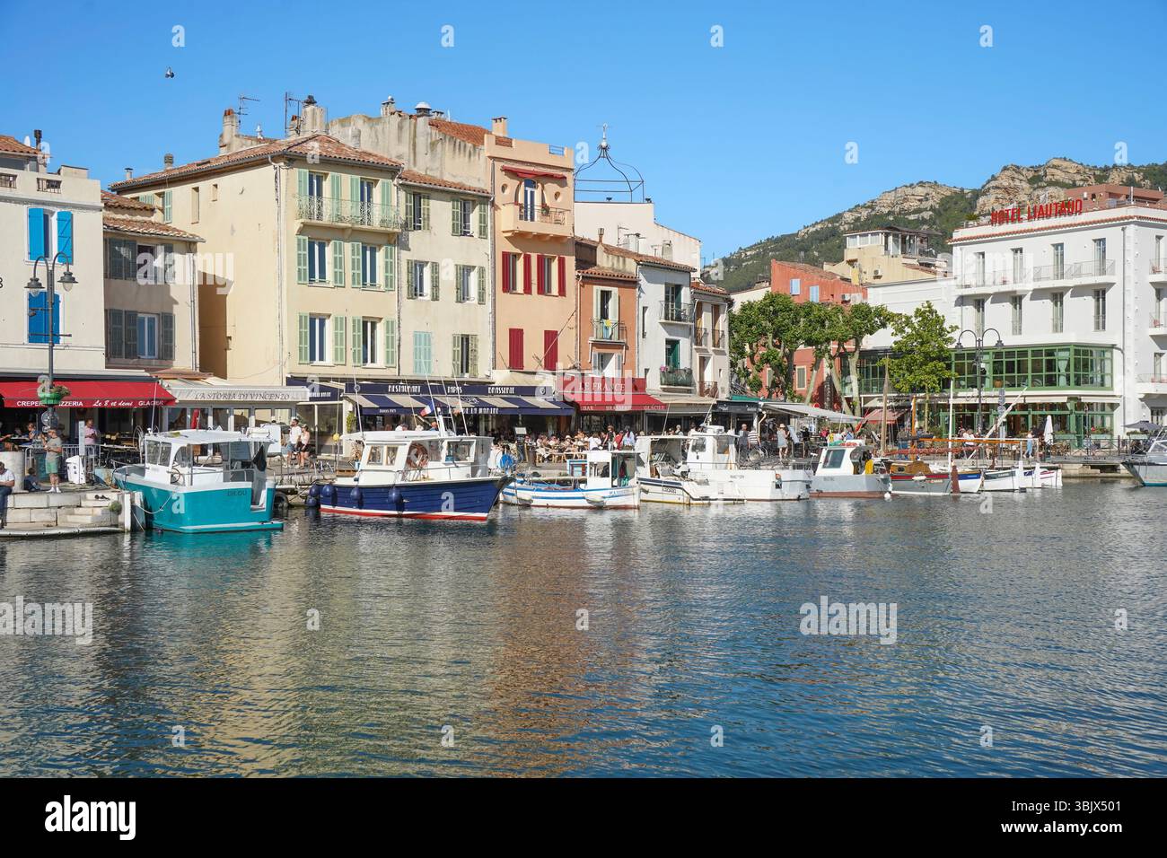 Cassis France, Colorful buildings and old fishing port with boats French mediterranean town ...