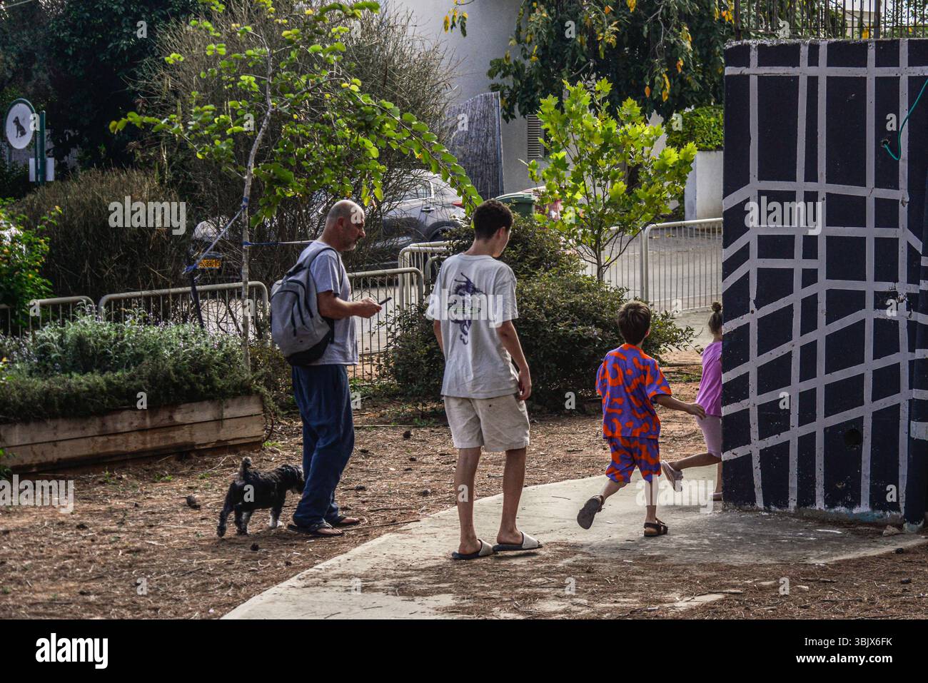 Israel. 17th June, 2025. Israeli families enter public shelters during ...