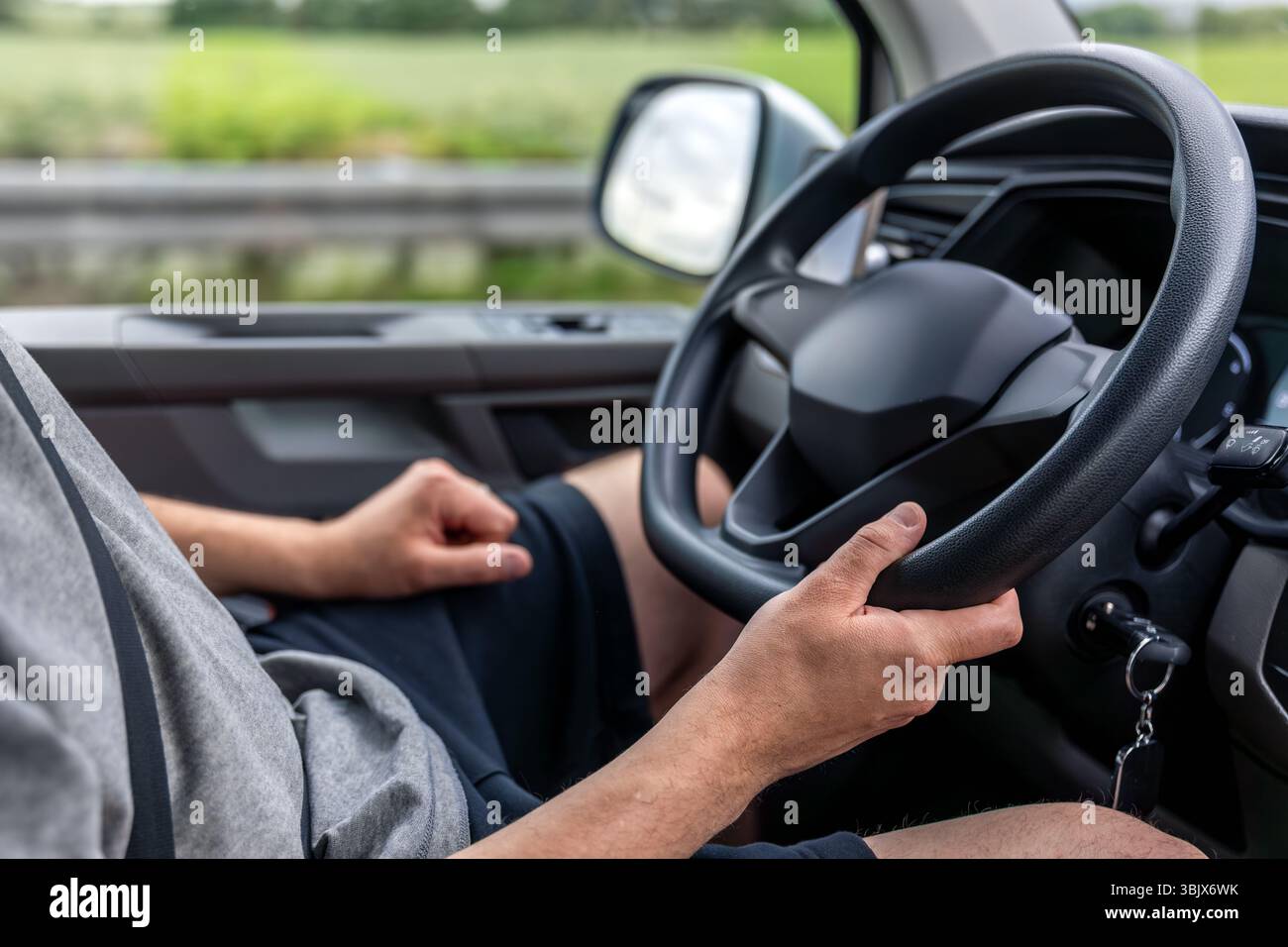 Driver hands on steering wheel. Inside car driving. Road control on ...