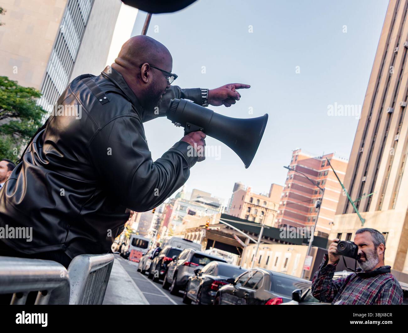 Man speaking in megaphone protest usa hi-res stock photography and ...