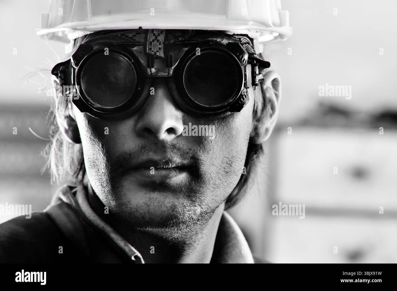 Woman in yellow helmet gloves hi-res stock photography and images - Alamy