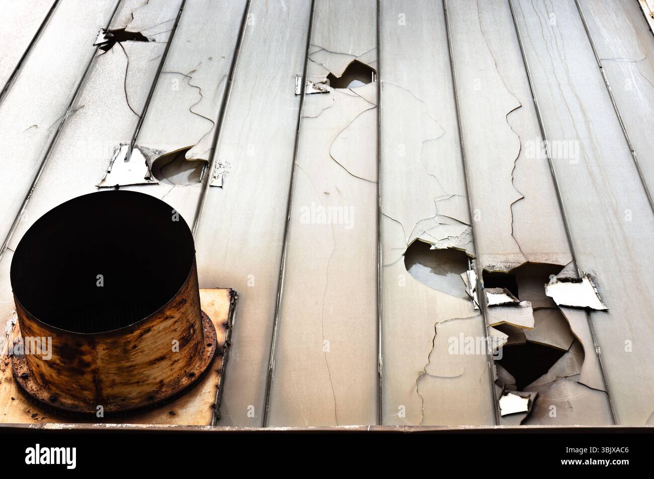 Broken glass and ventilation fan on abandoned industrial building Stock ...