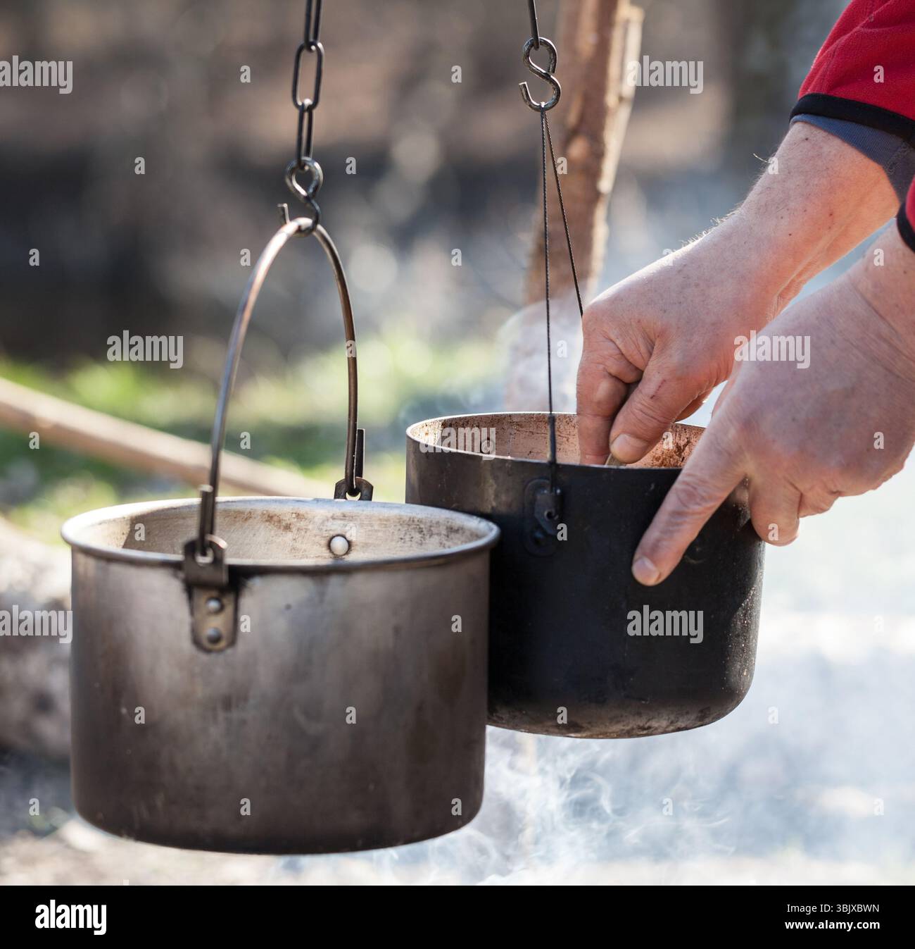 Man cooking on metal hi-res stock photography and images - Alamy