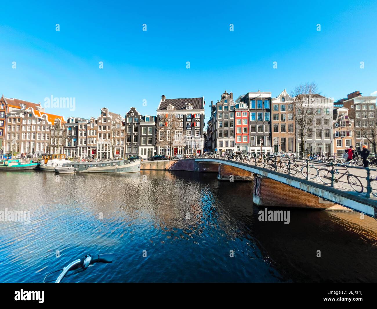 Historic canal houses bicycles hi-res stock photography and images - Alamy